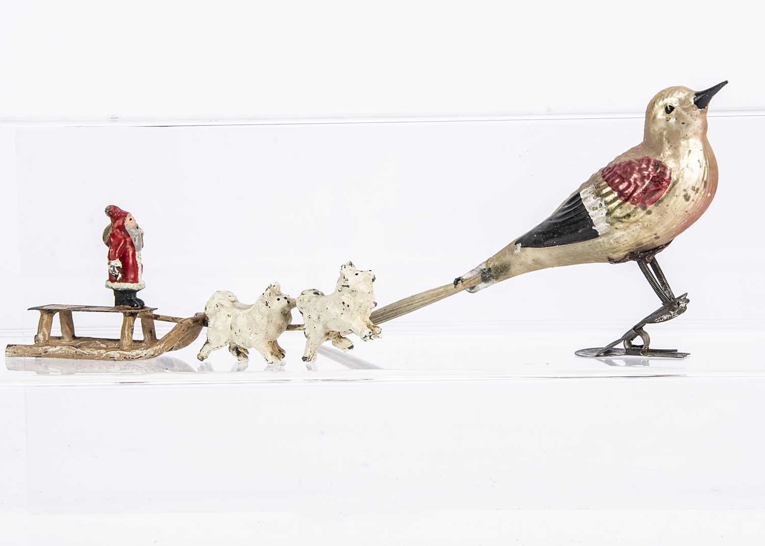 A rare Heyde trinket Father Christmas on dog sleigh, with four Huskies ...