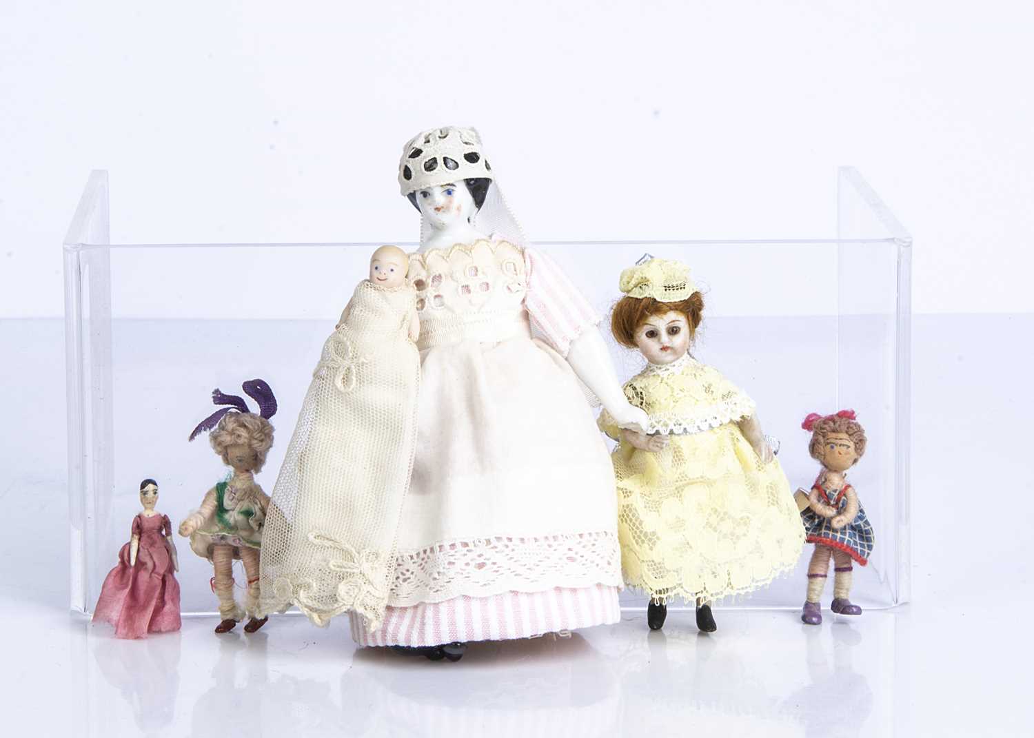 Five dolls’ house dolls, an all bisque with glass eyes —3 3/4in. (9.5cm ...