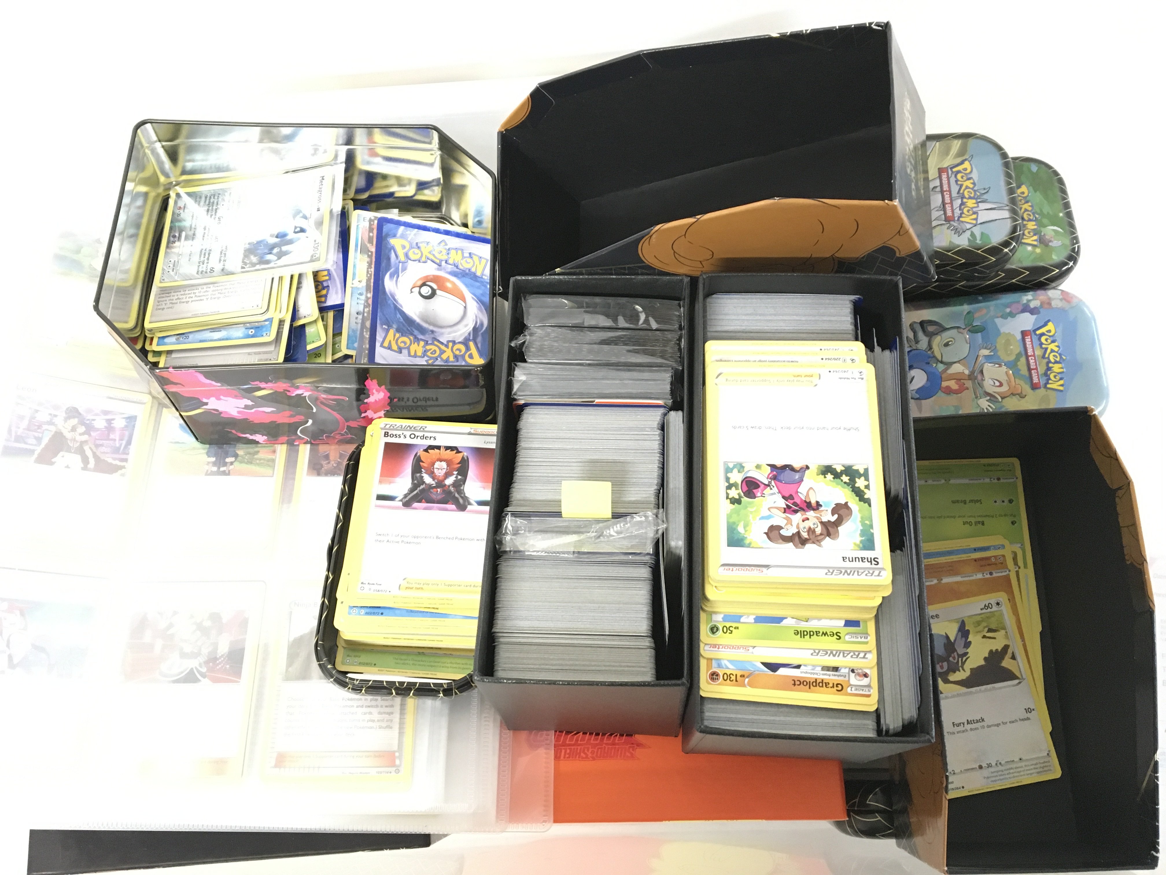 A Box Containing Modern Pokemon Cards. At least 1000.