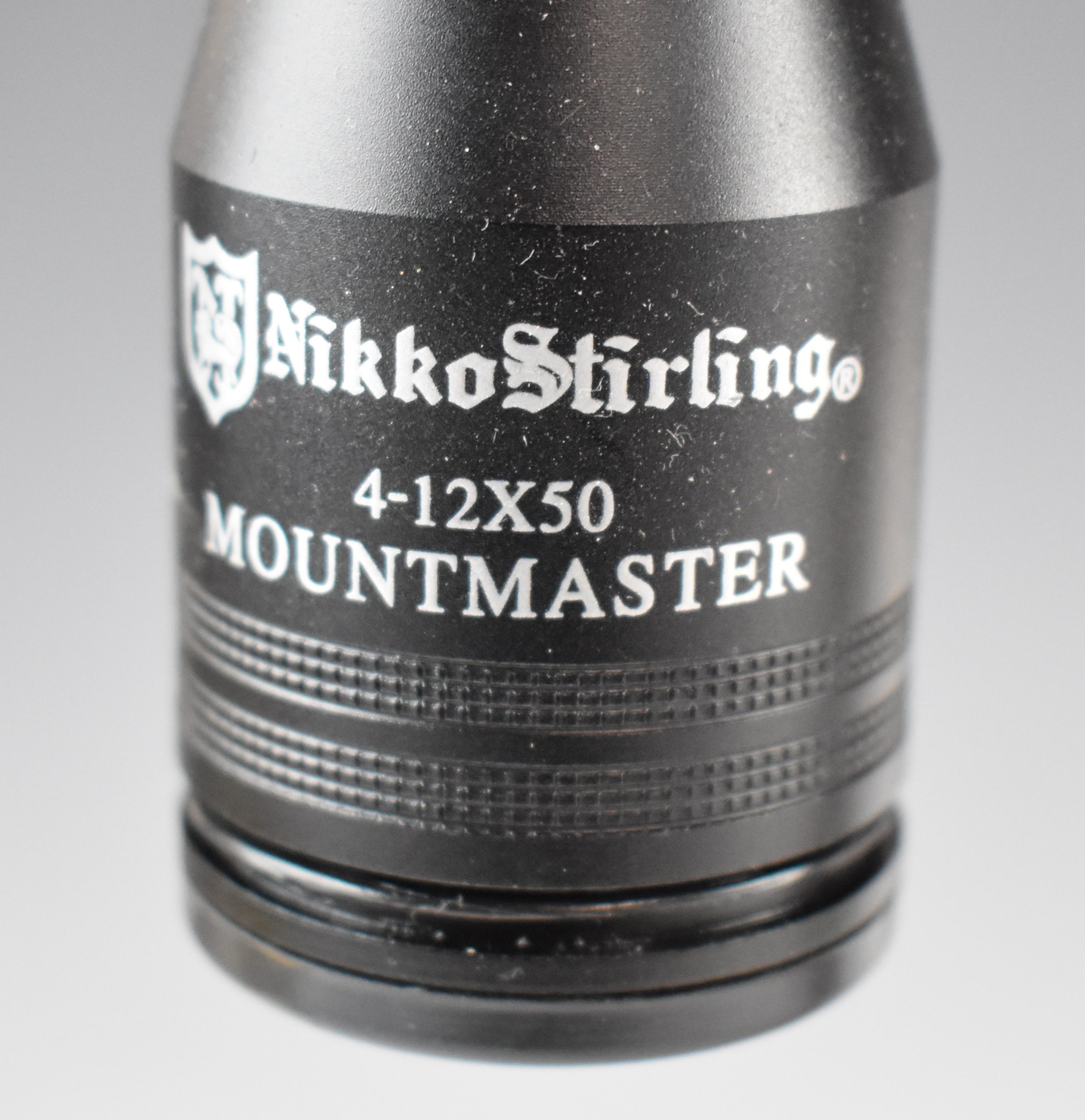 Three various air rifle stocks, all mounted with scopes comprising ...