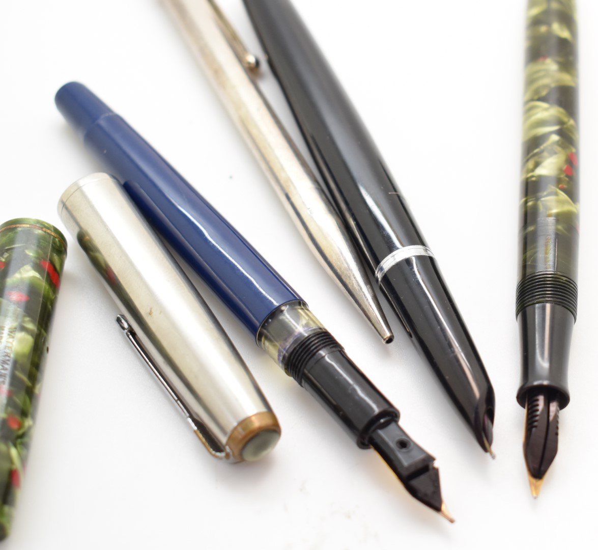 Eleven fountain pens and propelling pencils including Waterman with ...