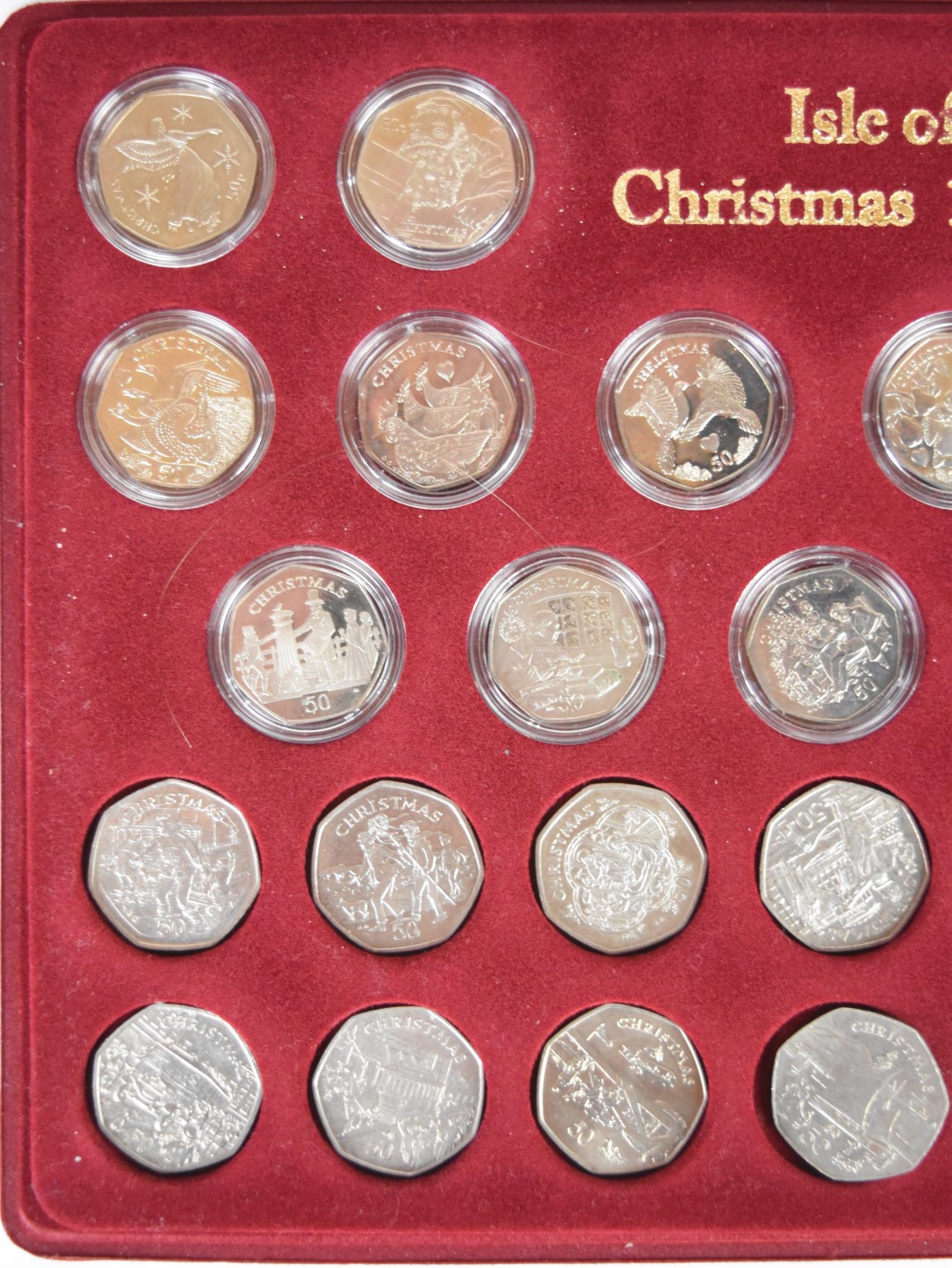 Isle of Man complete set of 1980-2012 Christmas 50p coins, in fitted tray