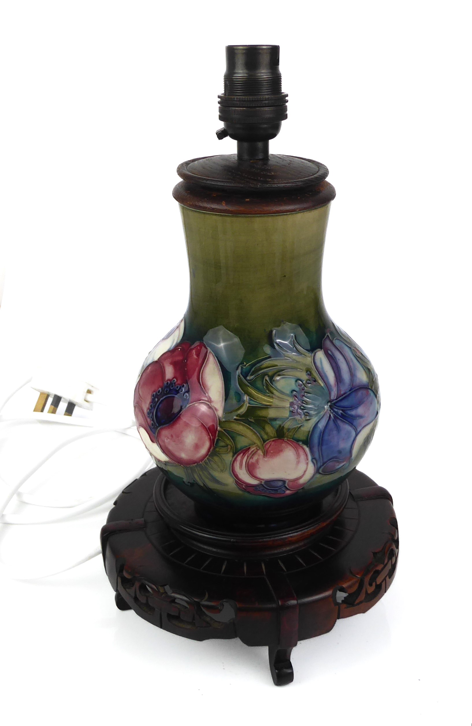 A decorative early 20th century Moorcroft vase now as a lamp base with ...