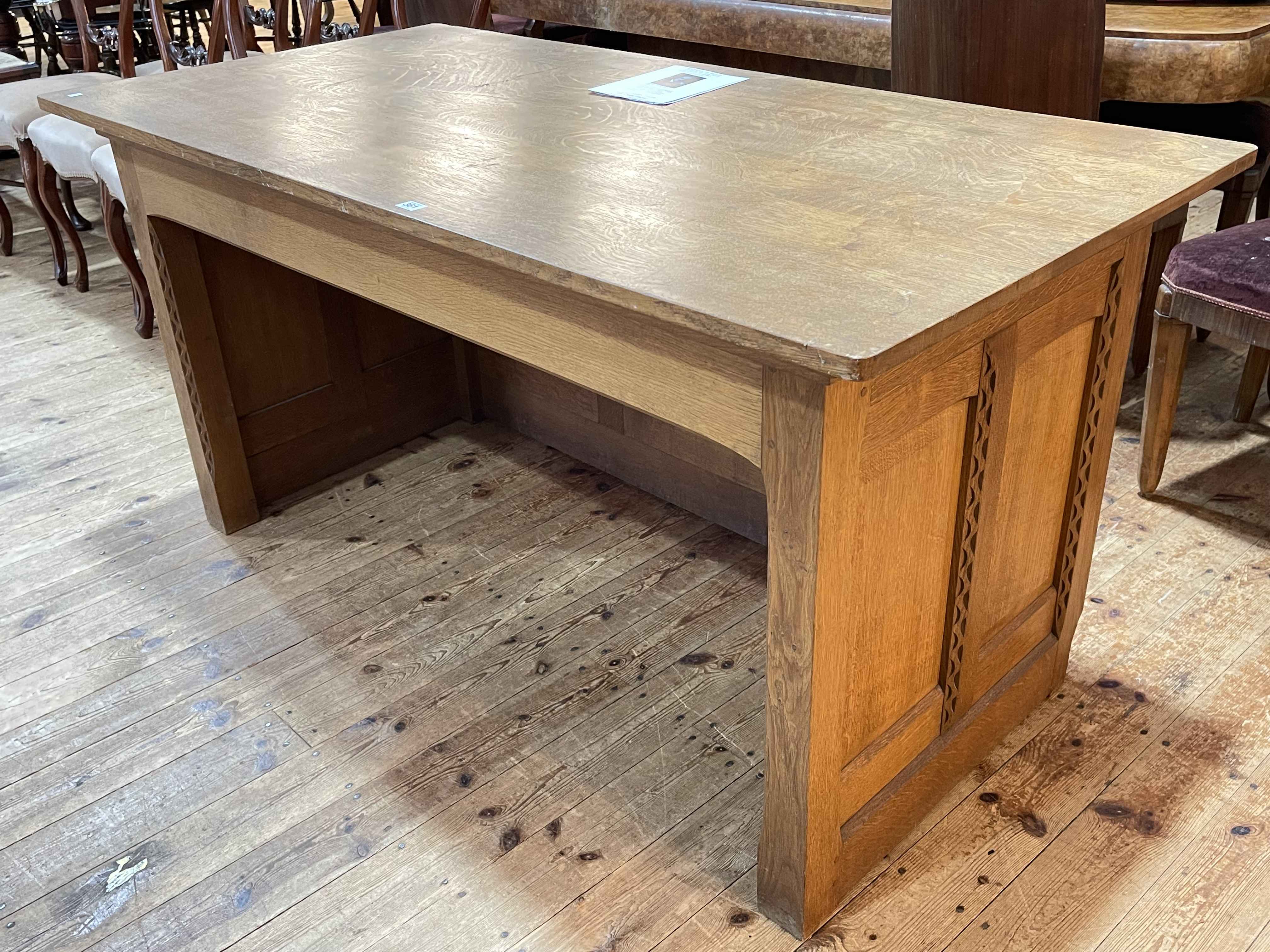 Stanley Webb Davies, An Arts & Crafts oak desk/table, signed and dated ...