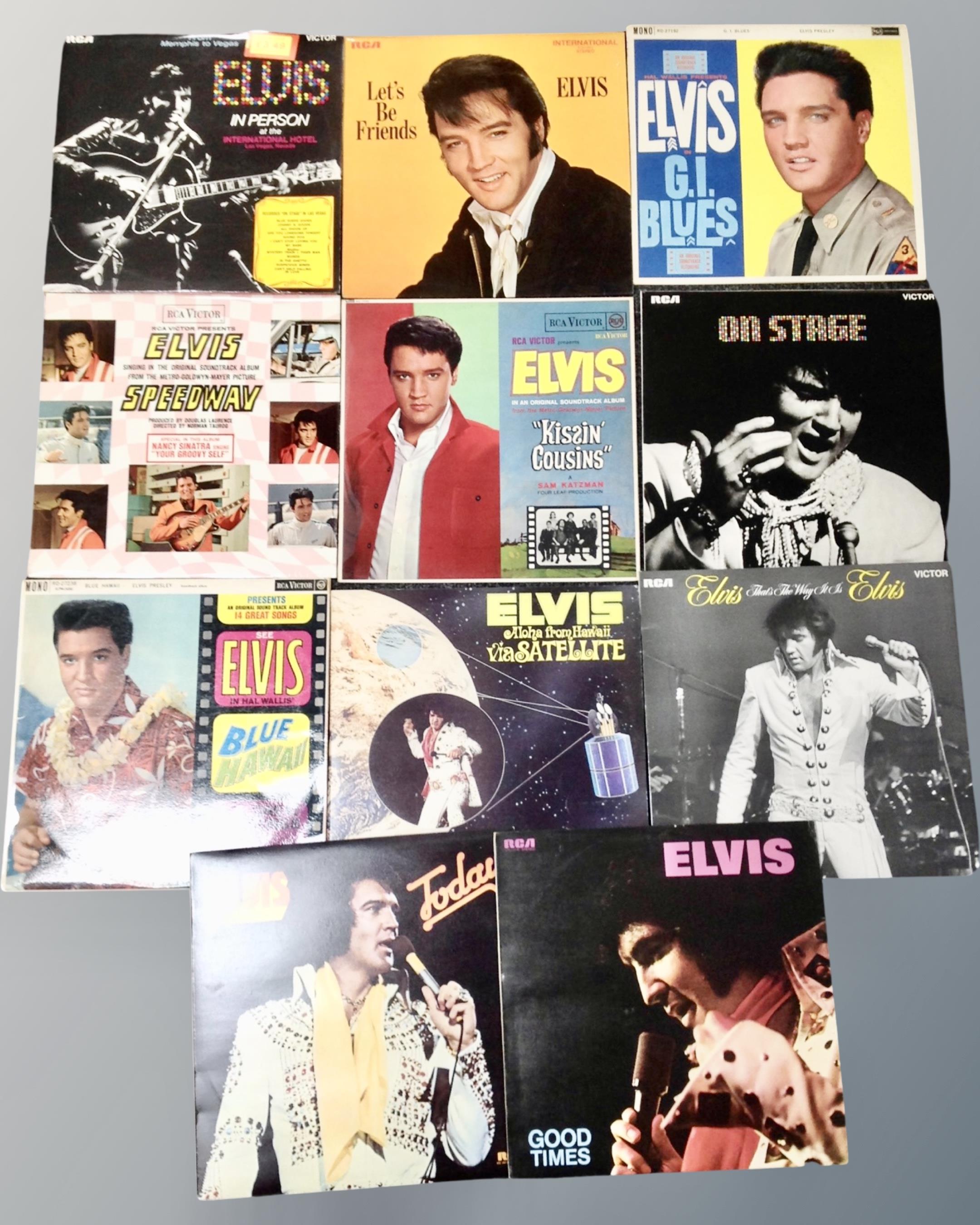 A box containing Elvis Presley vinyl records including albums, 78s and ...