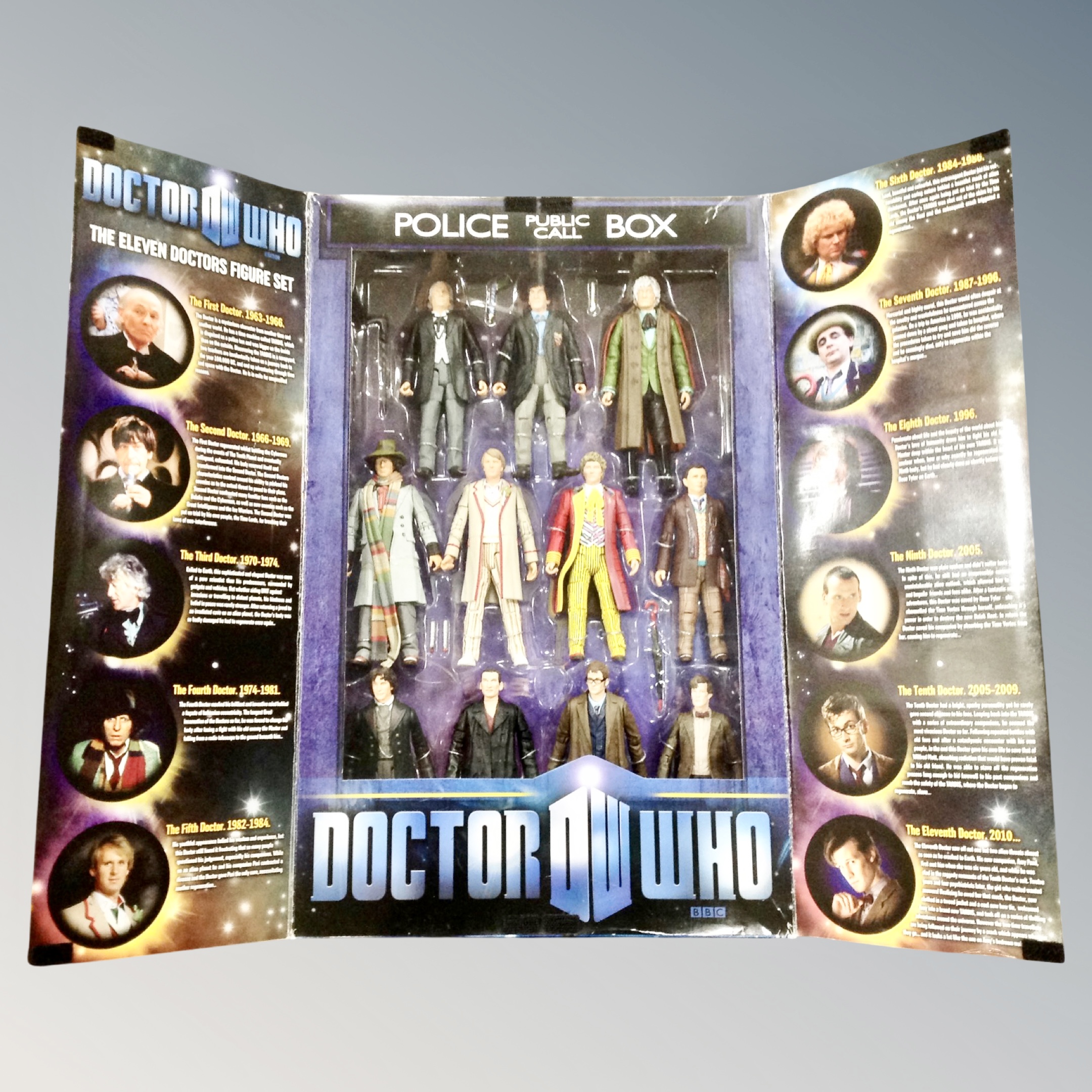 A Dr Who eleven doctors action figures set in Tardis box