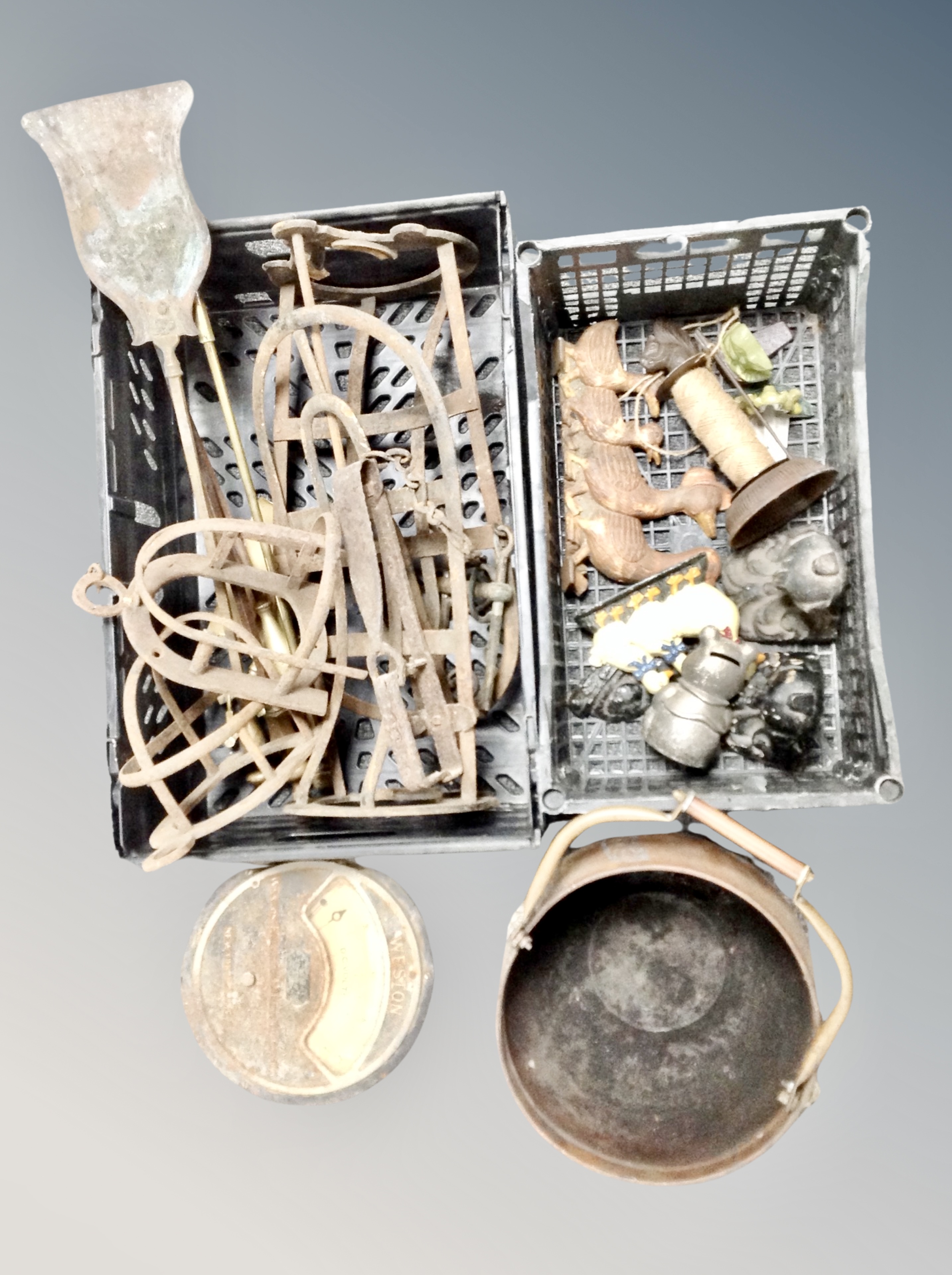 Two crates of antique and later metal ware, swing handled coal bucket ...