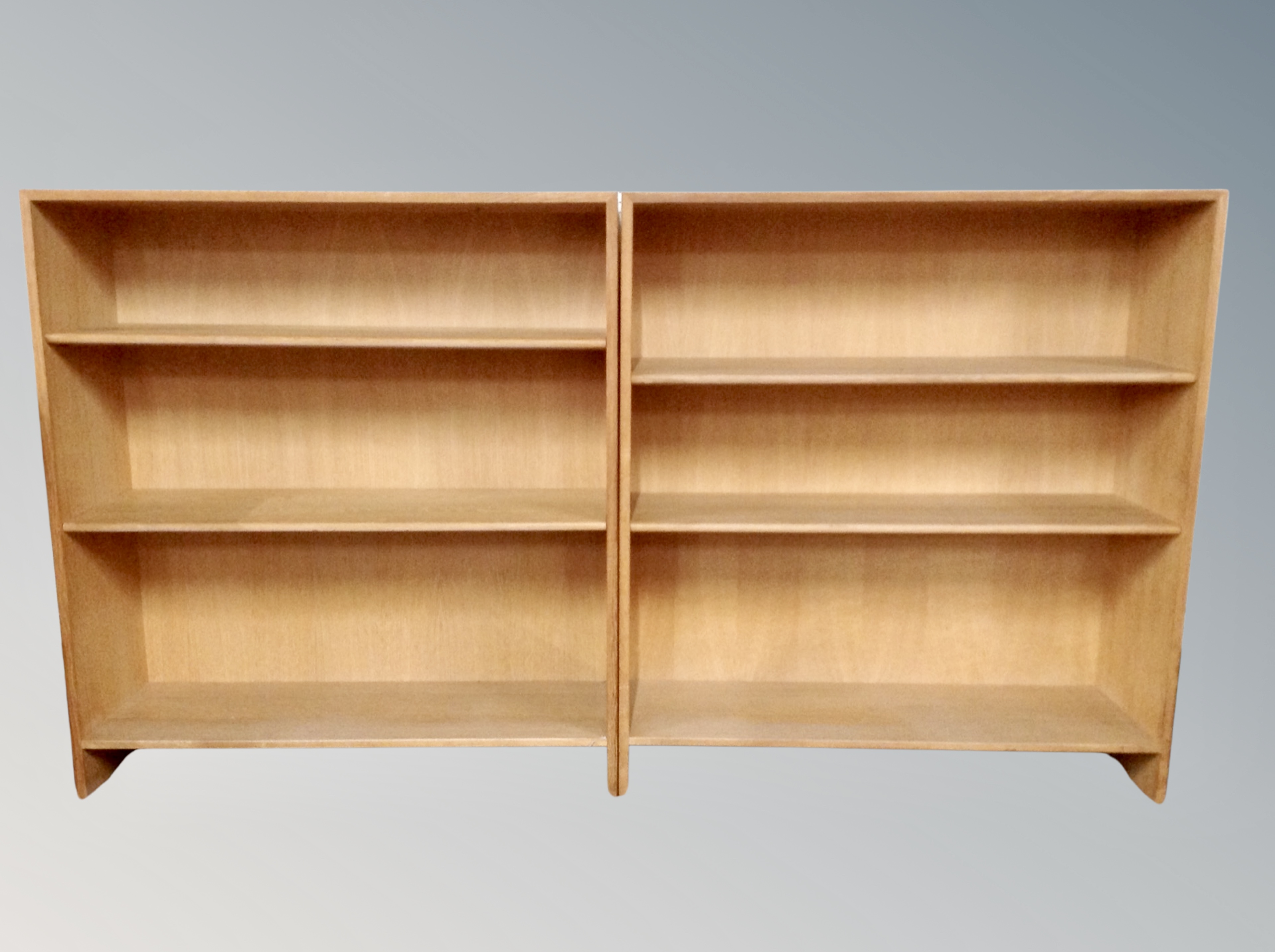 A pair of oak bookcases, each 100 cm wide
