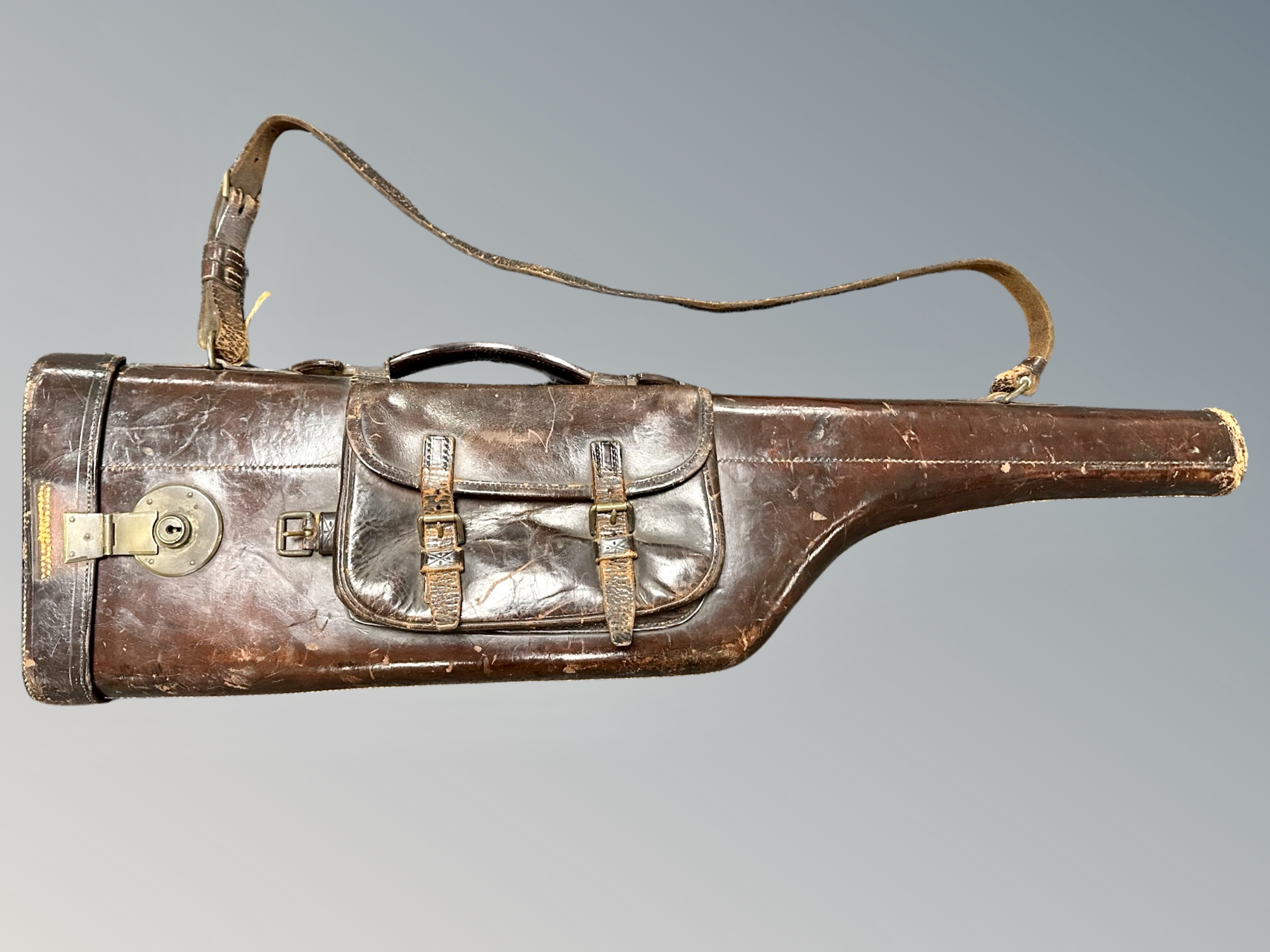 A 19th century stitched brown leather leg o' mutton shotgun case ...