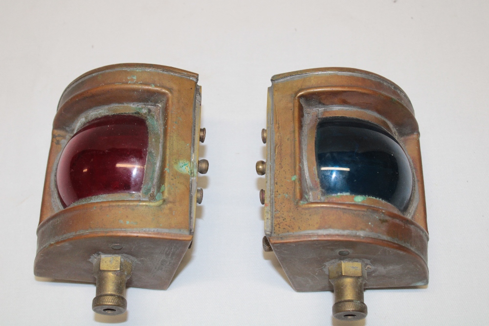 A pair of small brass nautical port and starboard lamps by Simpson ...