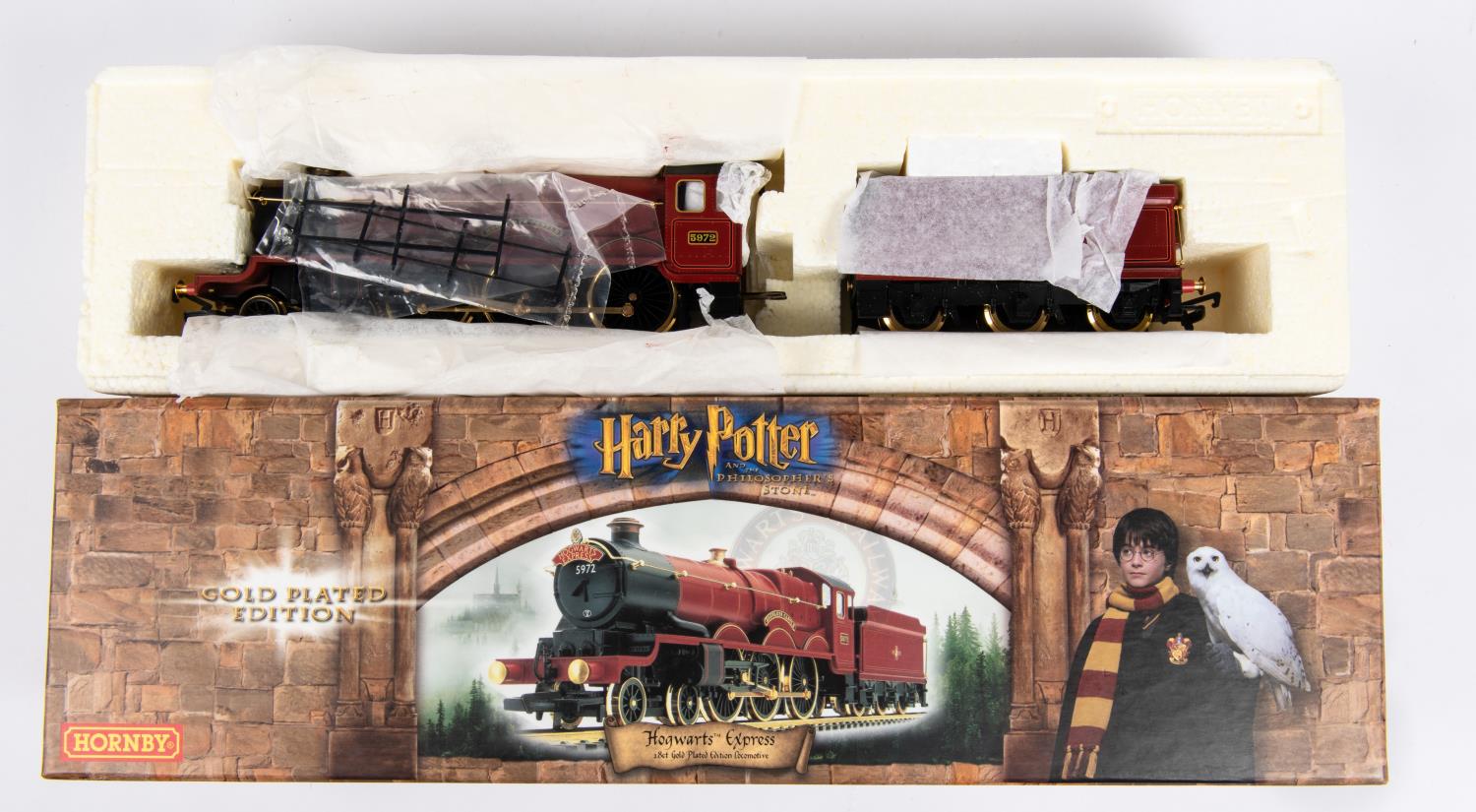 A Hornby OO gauge Harry Potter Hogwarts Express (R2301). 4-6-0 Hall ...