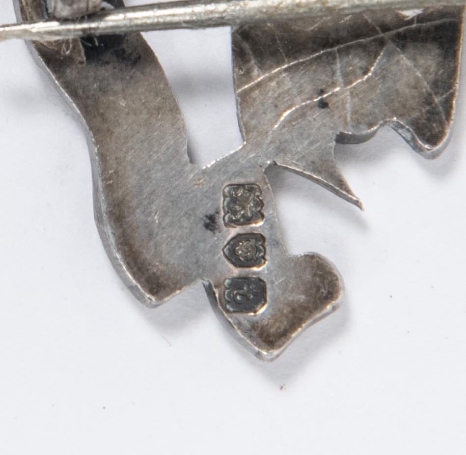 WWI Liverpool Pals silver cap badge, with maker's mark "E&C", London ...