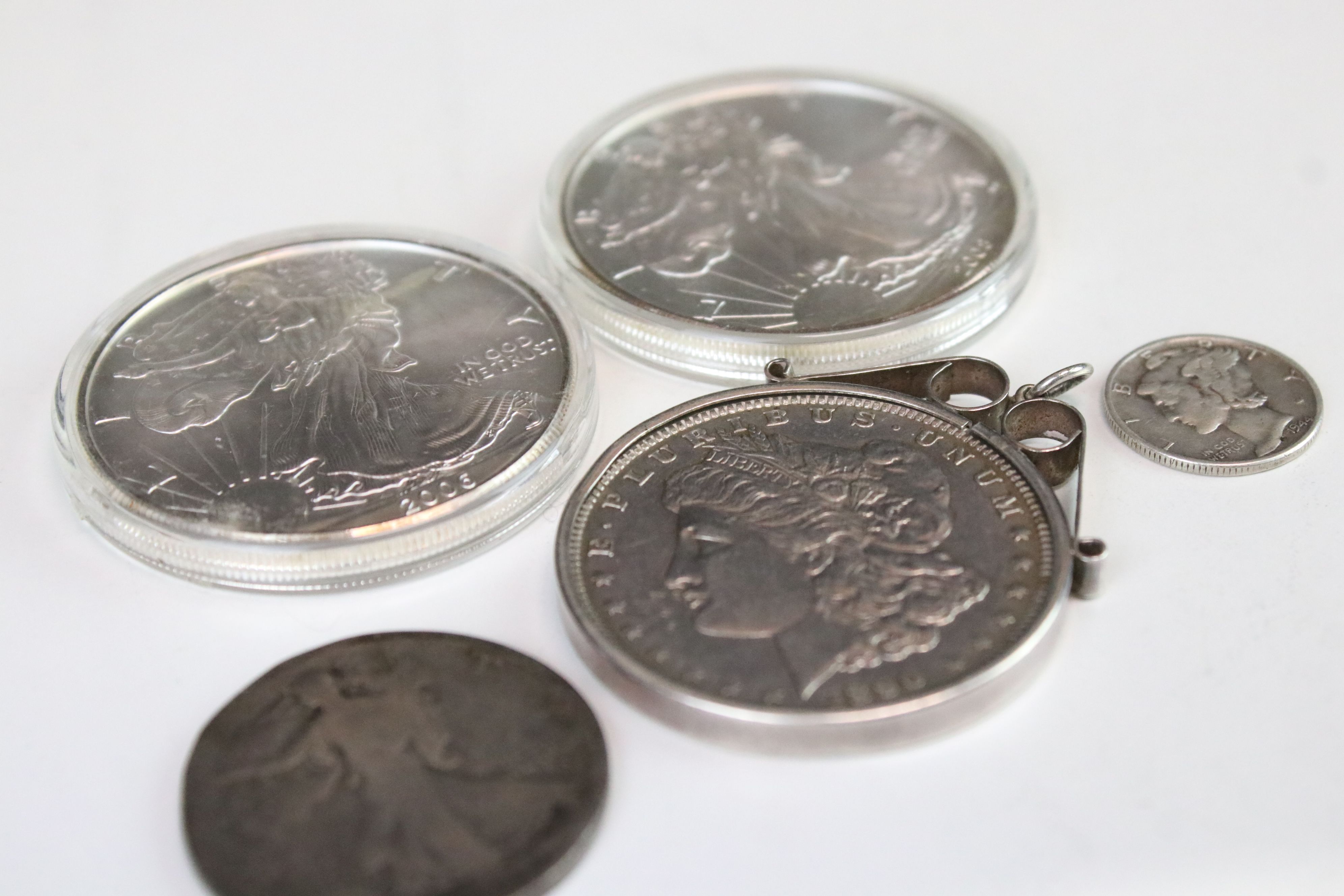 A small collection of United States of America silver coins two include ...