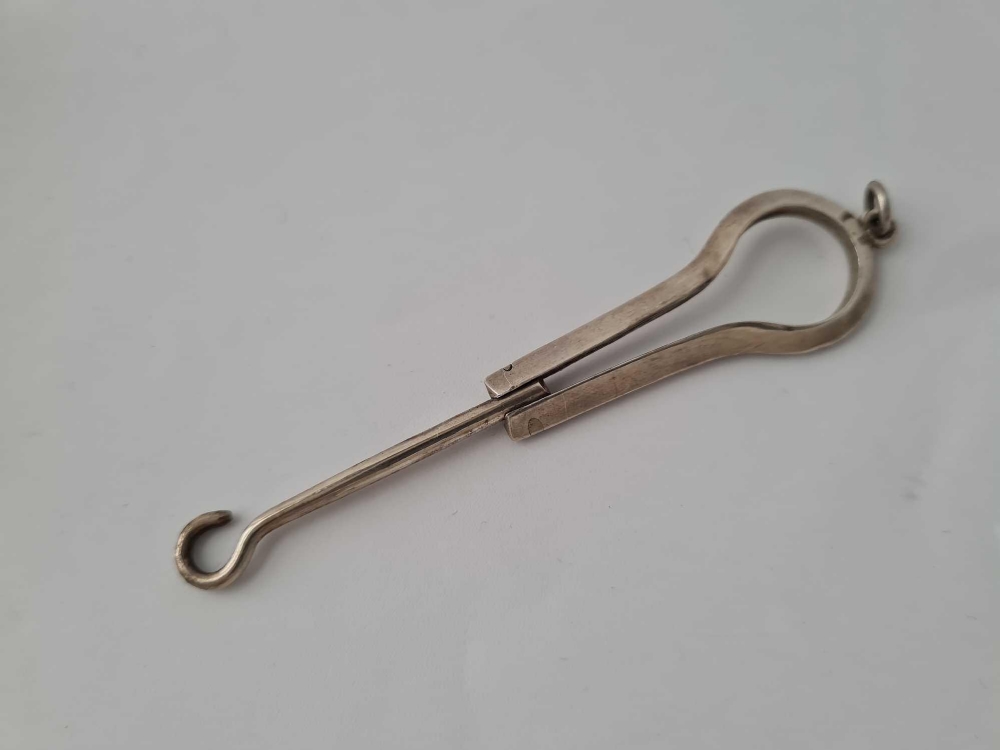 A folding silver button hook, 2” closed Birmingham 1901