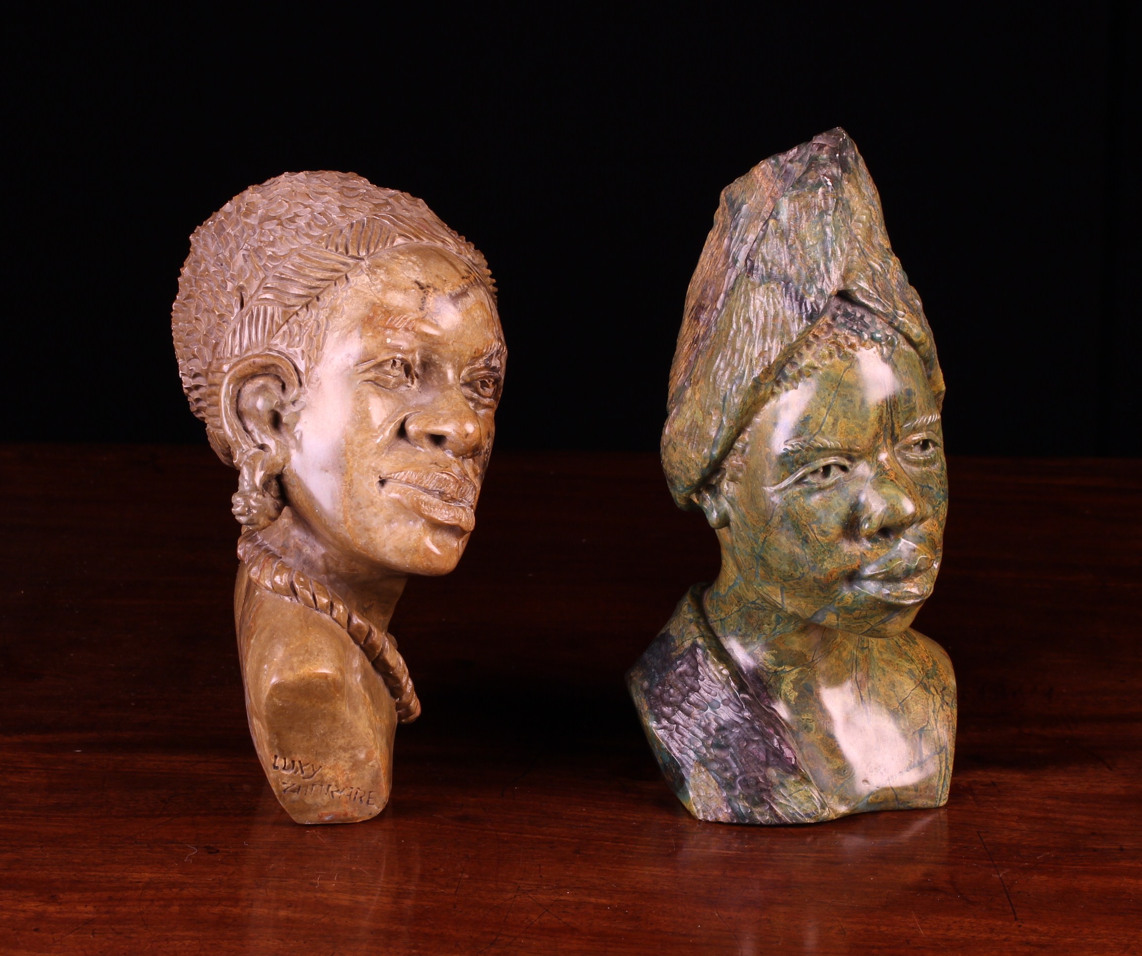 Two Vintage African Carved Stone Busts: One of a male in brown ...