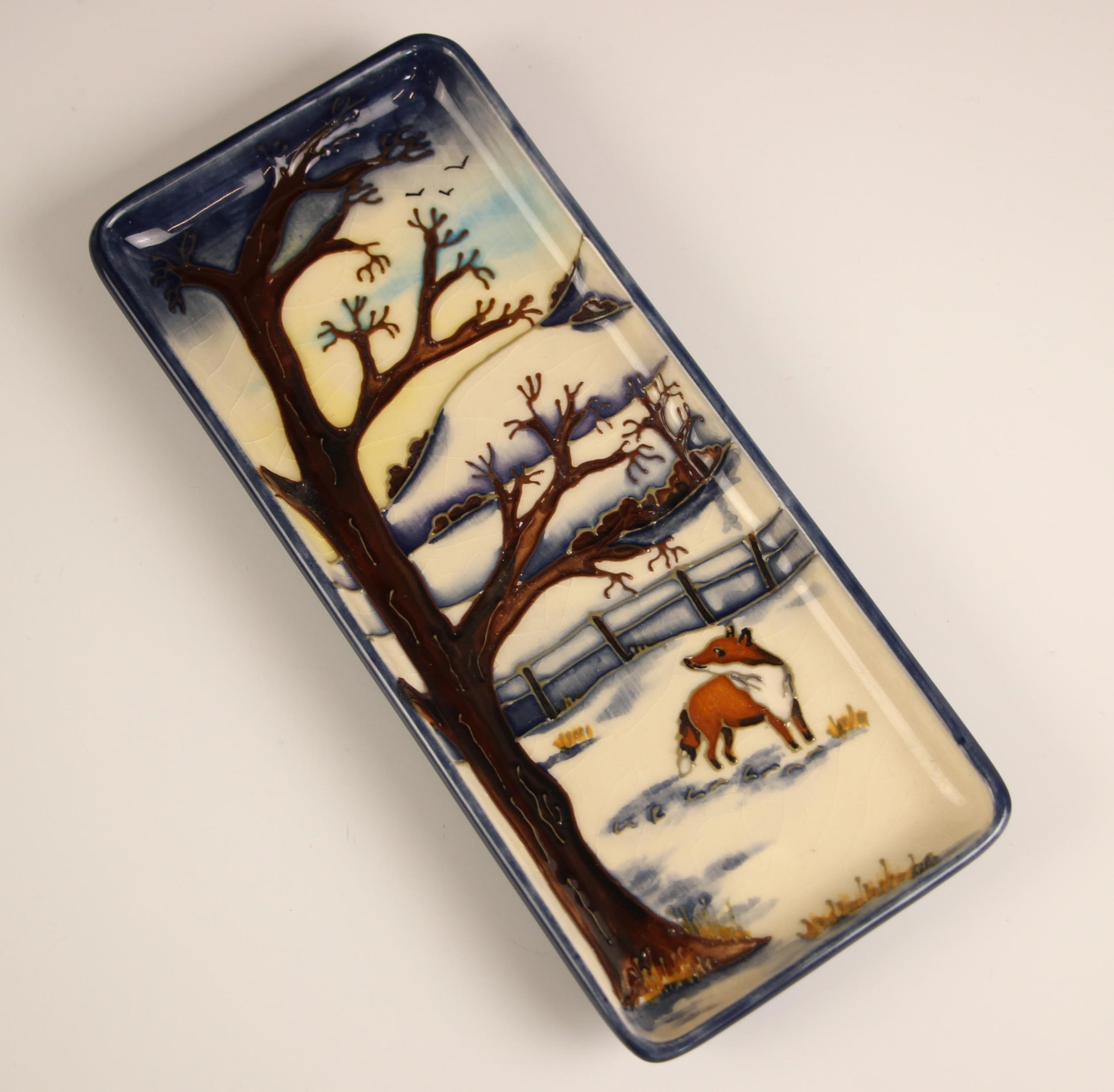 A Moorcroft rectangular dish in the 'Woodside Farm' pattern, designed ...