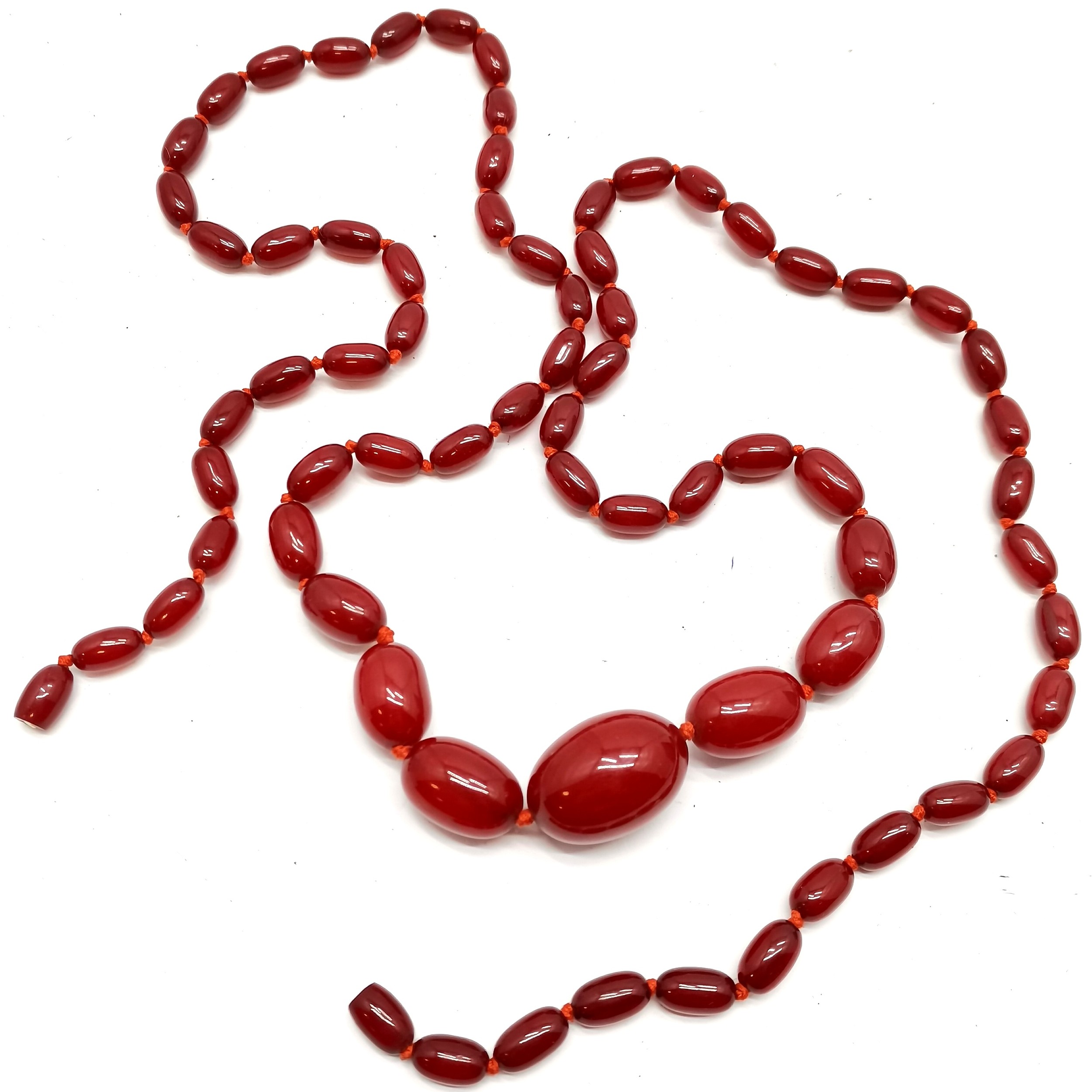 Long strand of cherry amber graduated beads - 110cm (largest bead 3cm ...