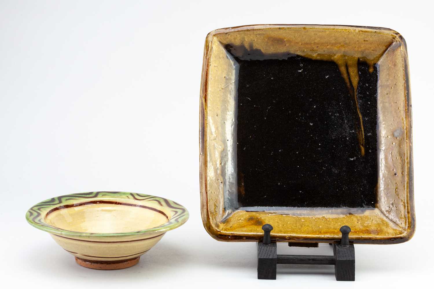 CLIVE BOWEN (born 1943); a square slipware tray, 24 x 23cm, and a bowl ...