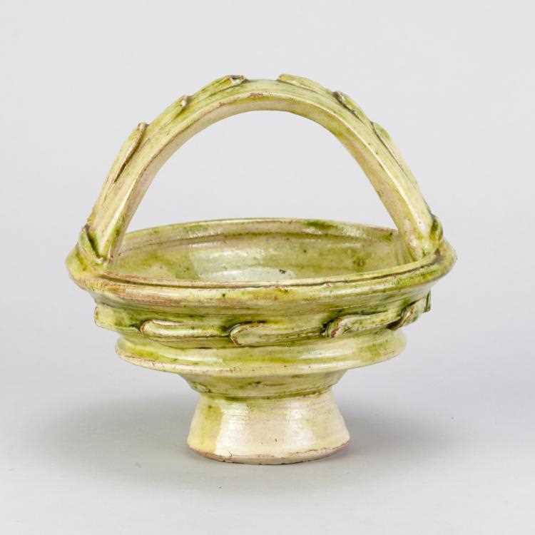 GEOFFREY FULLER (1936-2022); a small slip decorated earthenware basket ...
