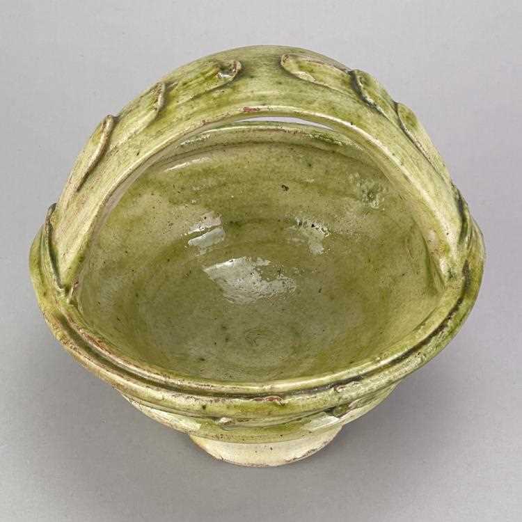 GEOFFREY FULLER (1936-2022); a small slip decorated earthenware basket ...