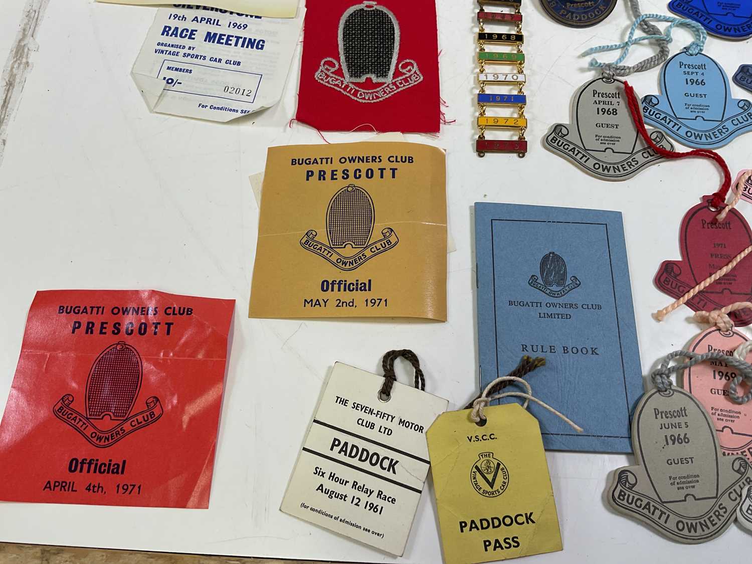 A collection of Bugatti Owners Club badges and ephemera including ...