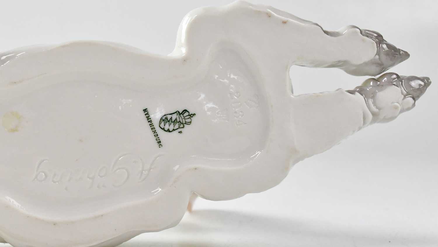 NYMPHENBURG; a 20th century porcelain model of a recumbent hare, by ...