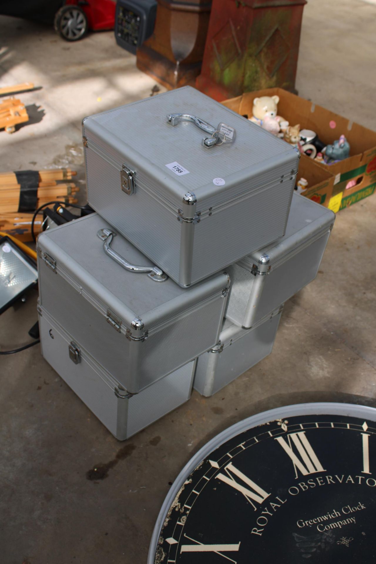 FIVE HARD SHELL LOCKING VANITY CASES