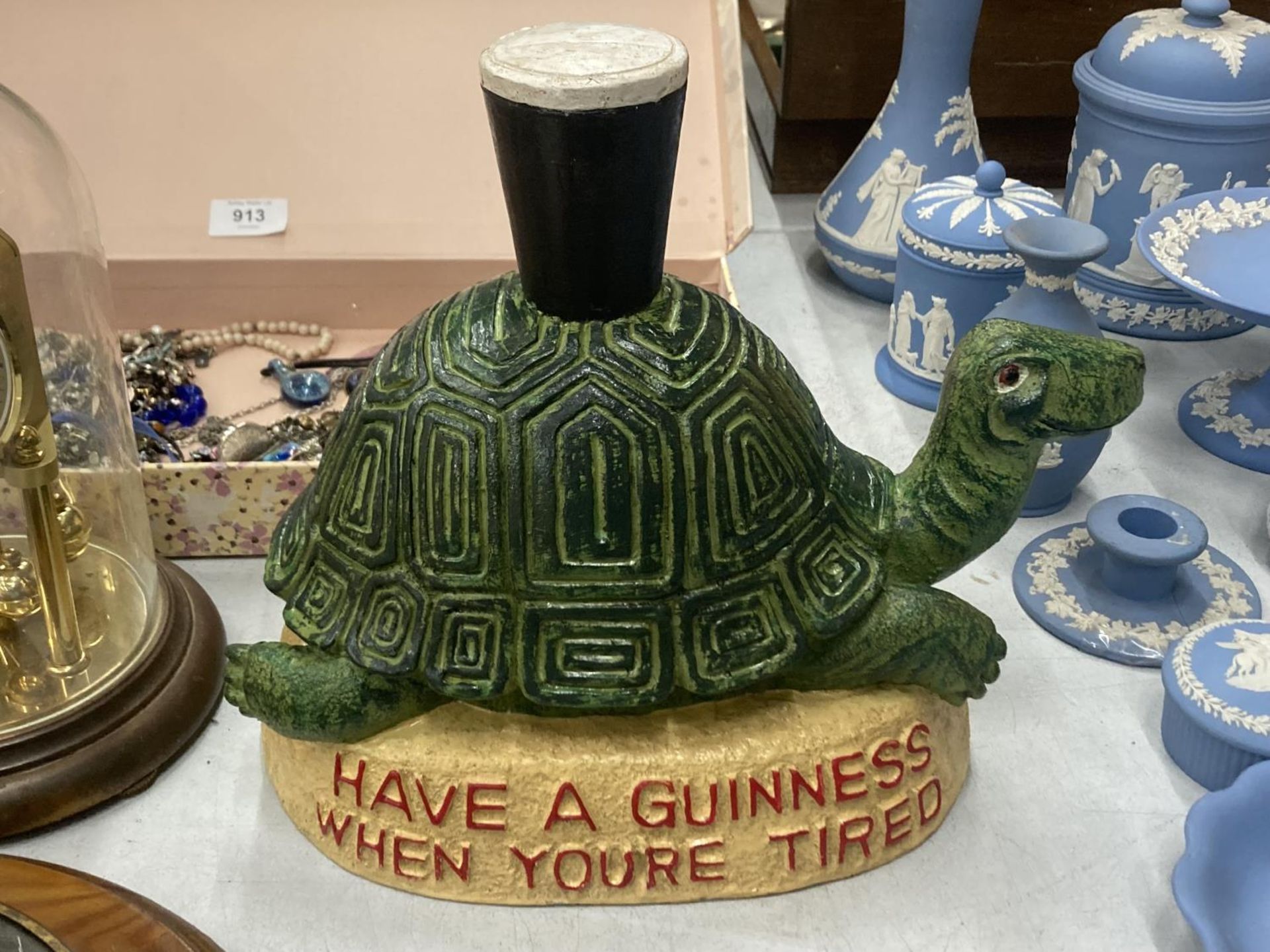 A LARGE GUINNESS RESIN TORTOISE ADVERTISING FIGURE