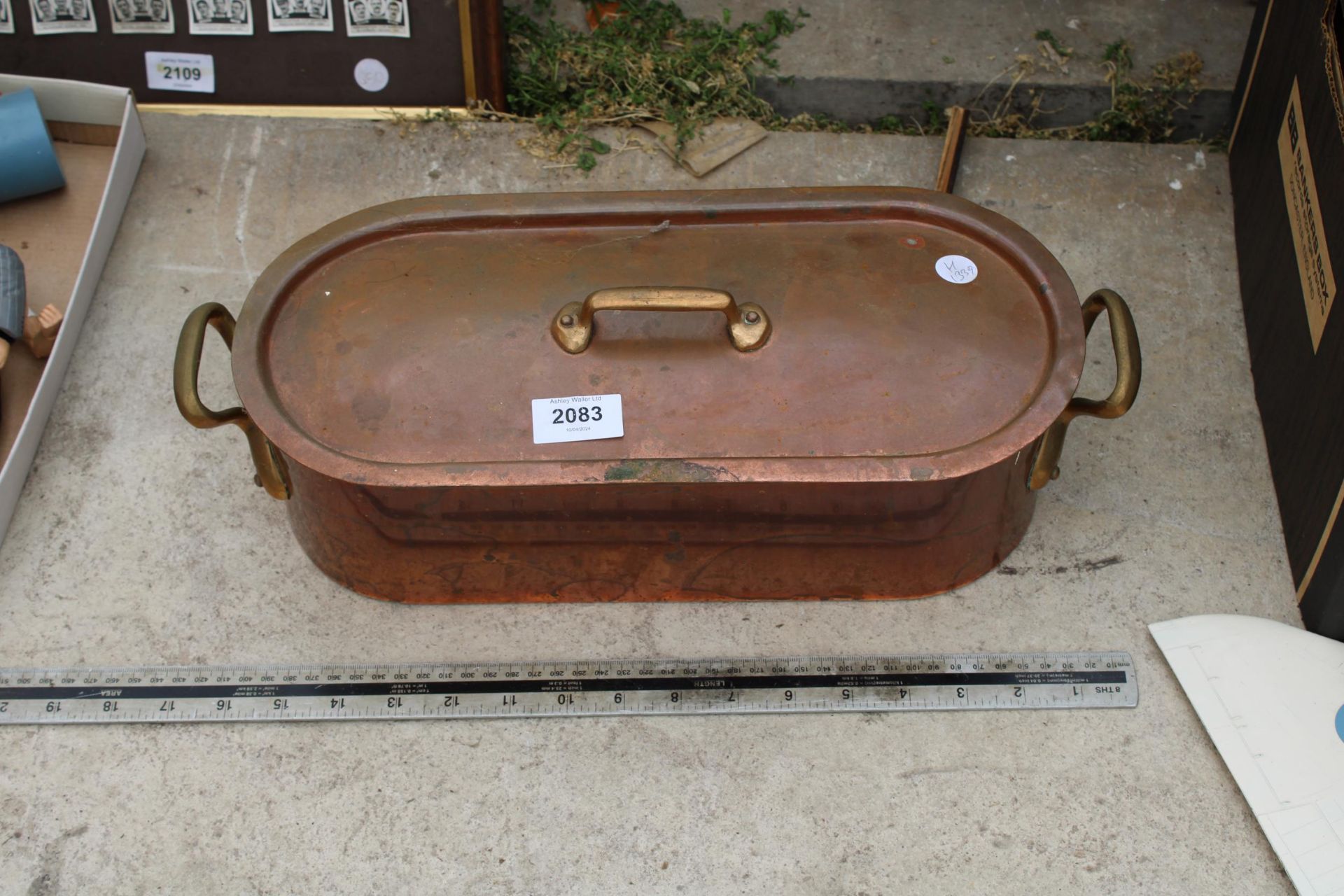 A VINTAGE COPPER LIDDED POT