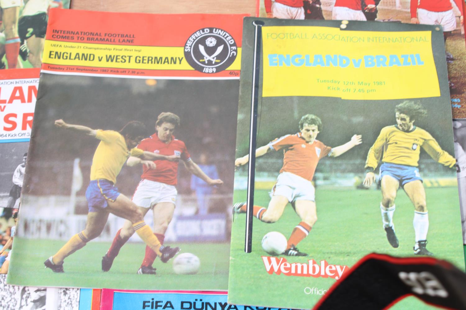 AN ASSORTMENT OF VINTAGE AND RETRO INTERNATIONAL FOOTBALL PROGRAMMES TO ...