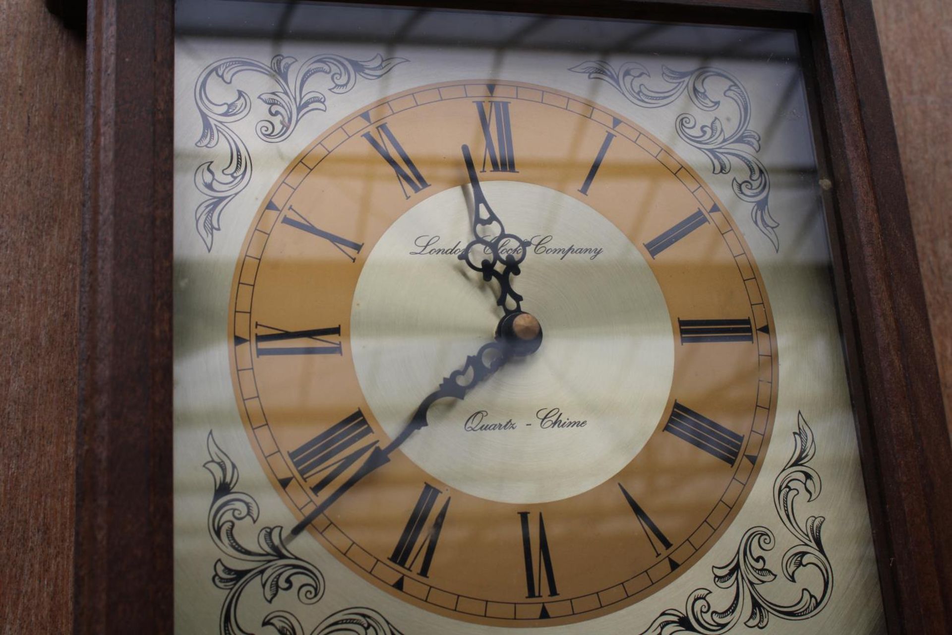 A LONDON CLOCK CO. QUARTZ WALL CLOCK