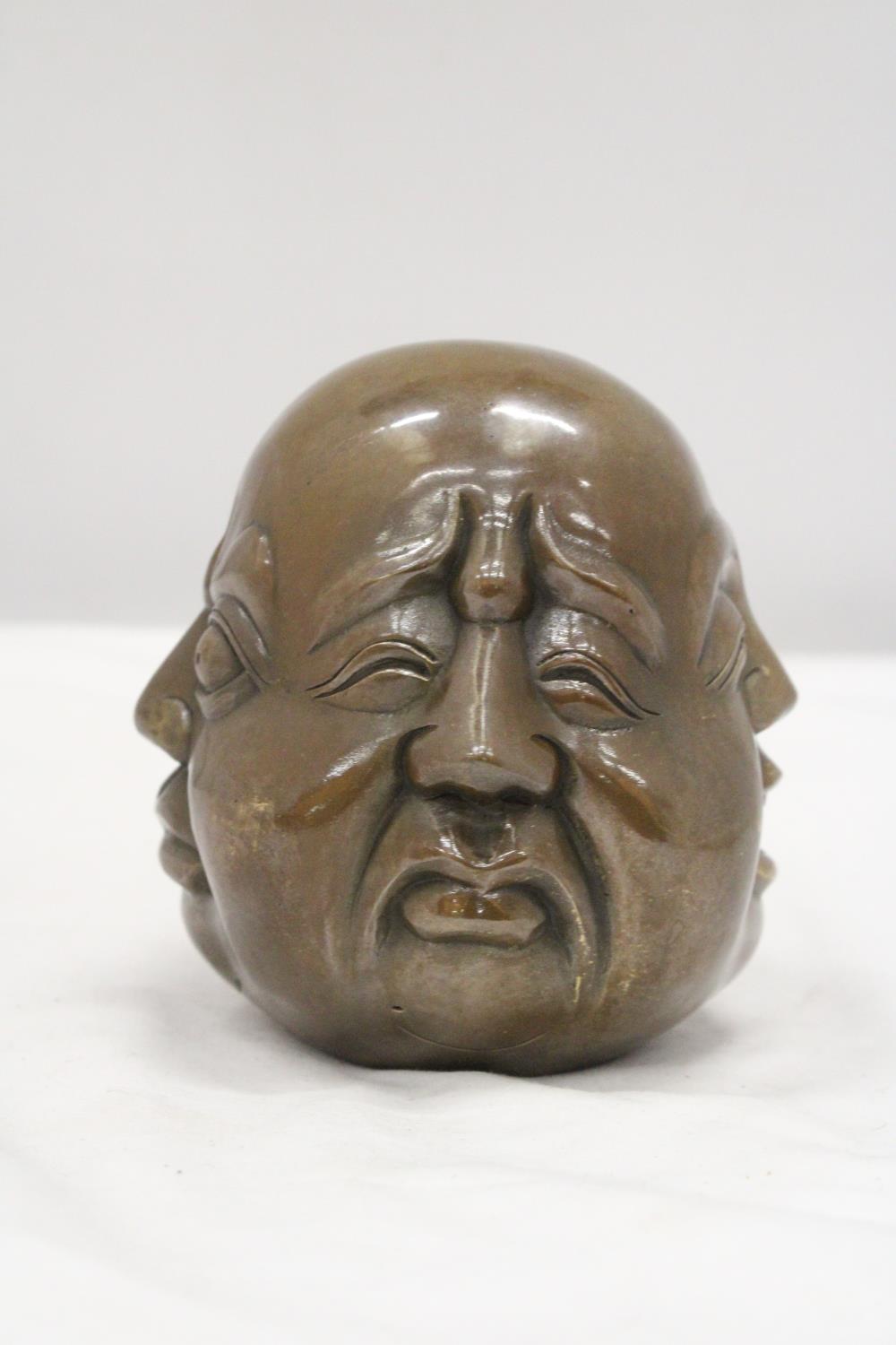 A LARGE BRONZE FOUR FACED BUDDHA