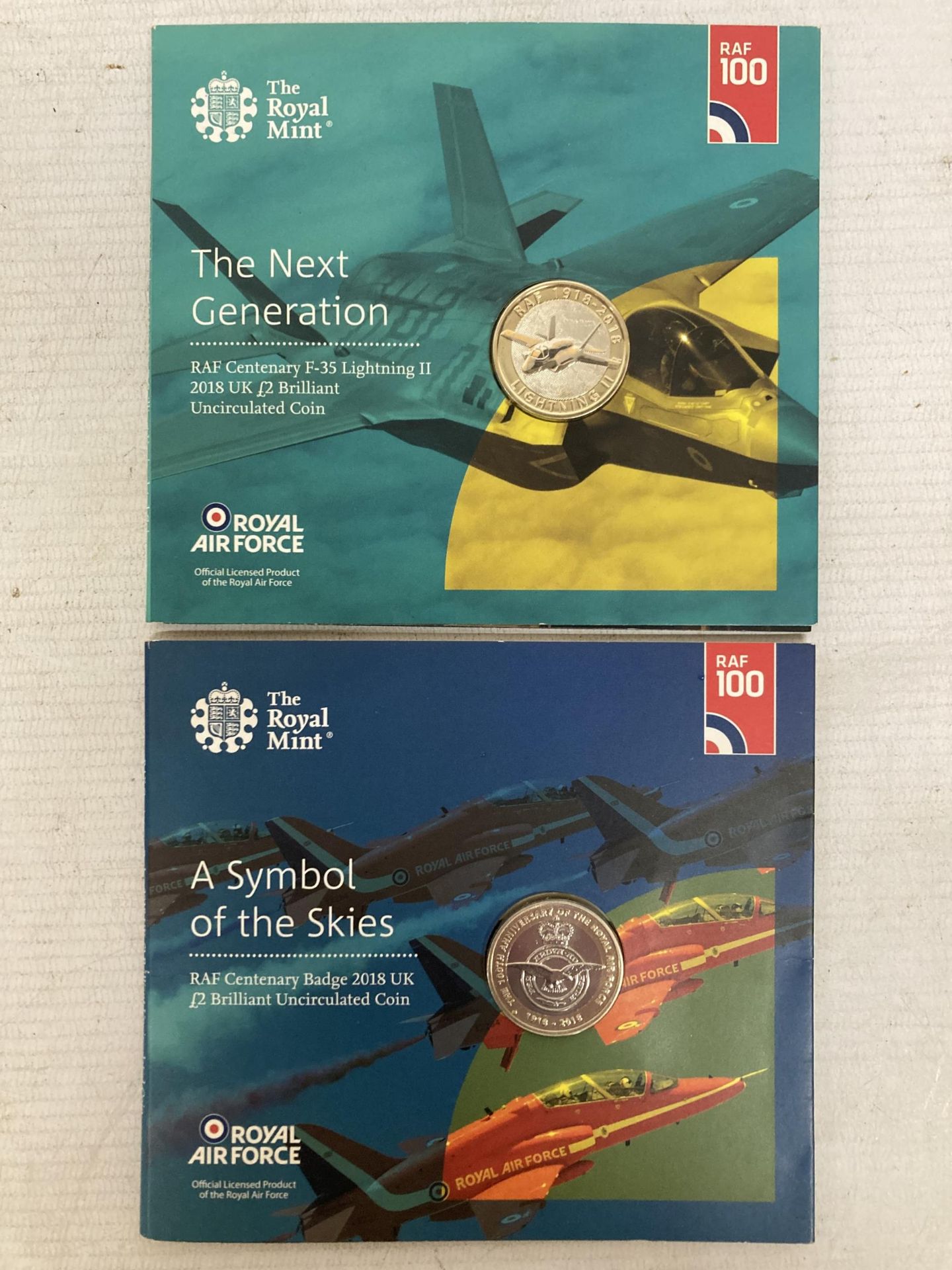 A ROYAL MINT COLLECTION OF TWO POUNDS AND 50P COMMEMORATIVE COINS TO ...