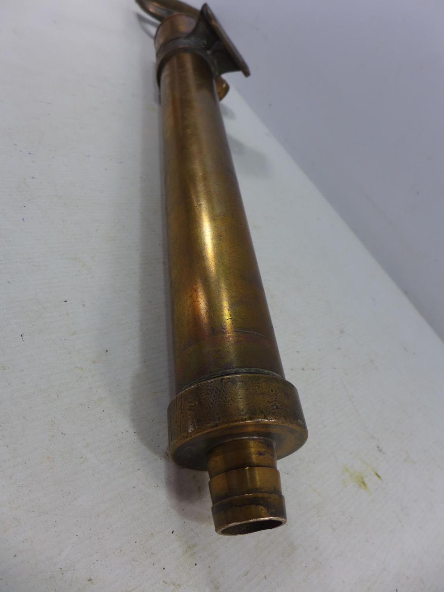A 1932 BRASS HAND PUMP FOR A LIFE BOAT, MADE BY NIKURA KOGYO CO LTD ...