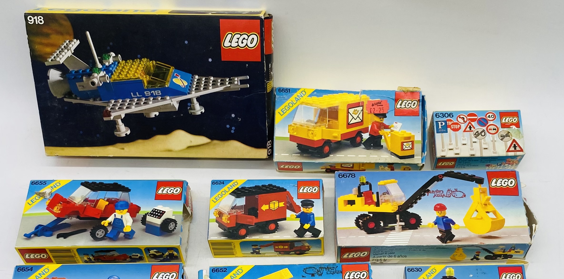 A collection of boxed 1980's Lego Legoland sets, mainly vehicles ...