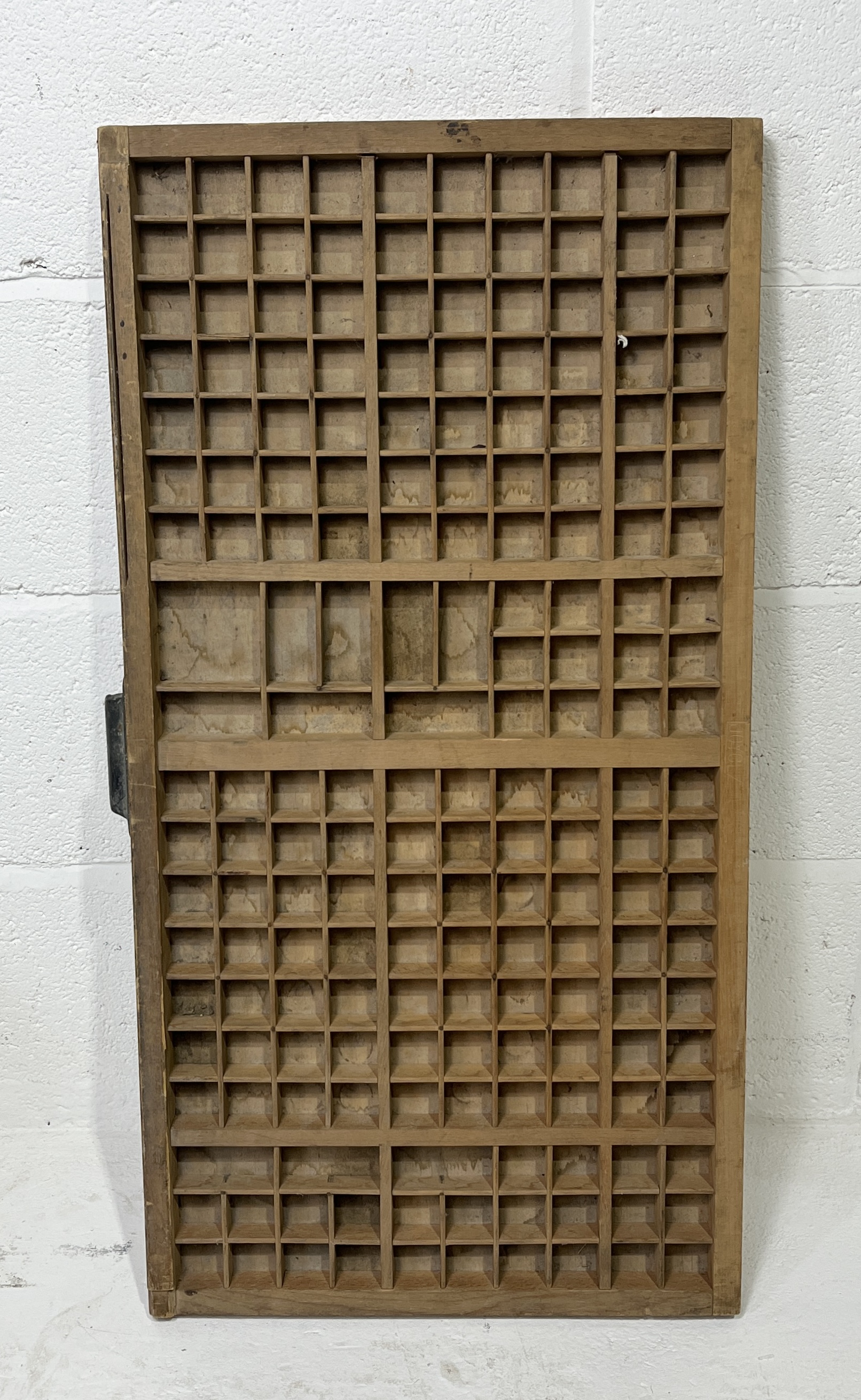 A vintage wooden printers tray