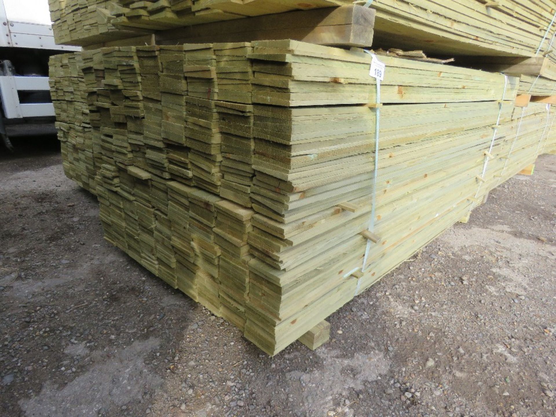 LARGE PACK OF PRESSURE TREATED FEATHER EDGE TIMBER CLADDING BOARDS. 1 ...