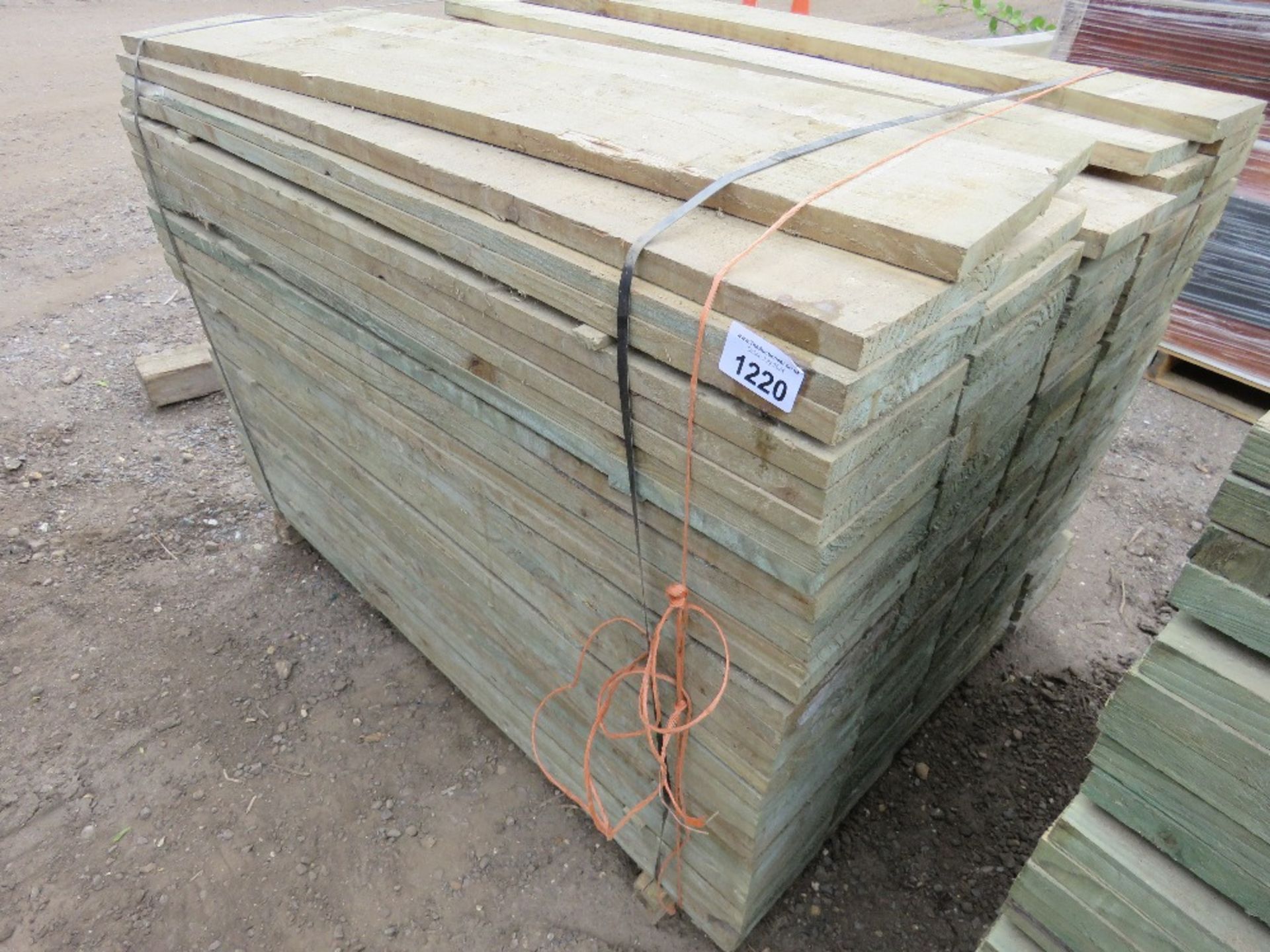STACK OF APPROXIMATELY 165NO TREATED UNUSED TIMBER BOARDS 190MM WIDTH X ...