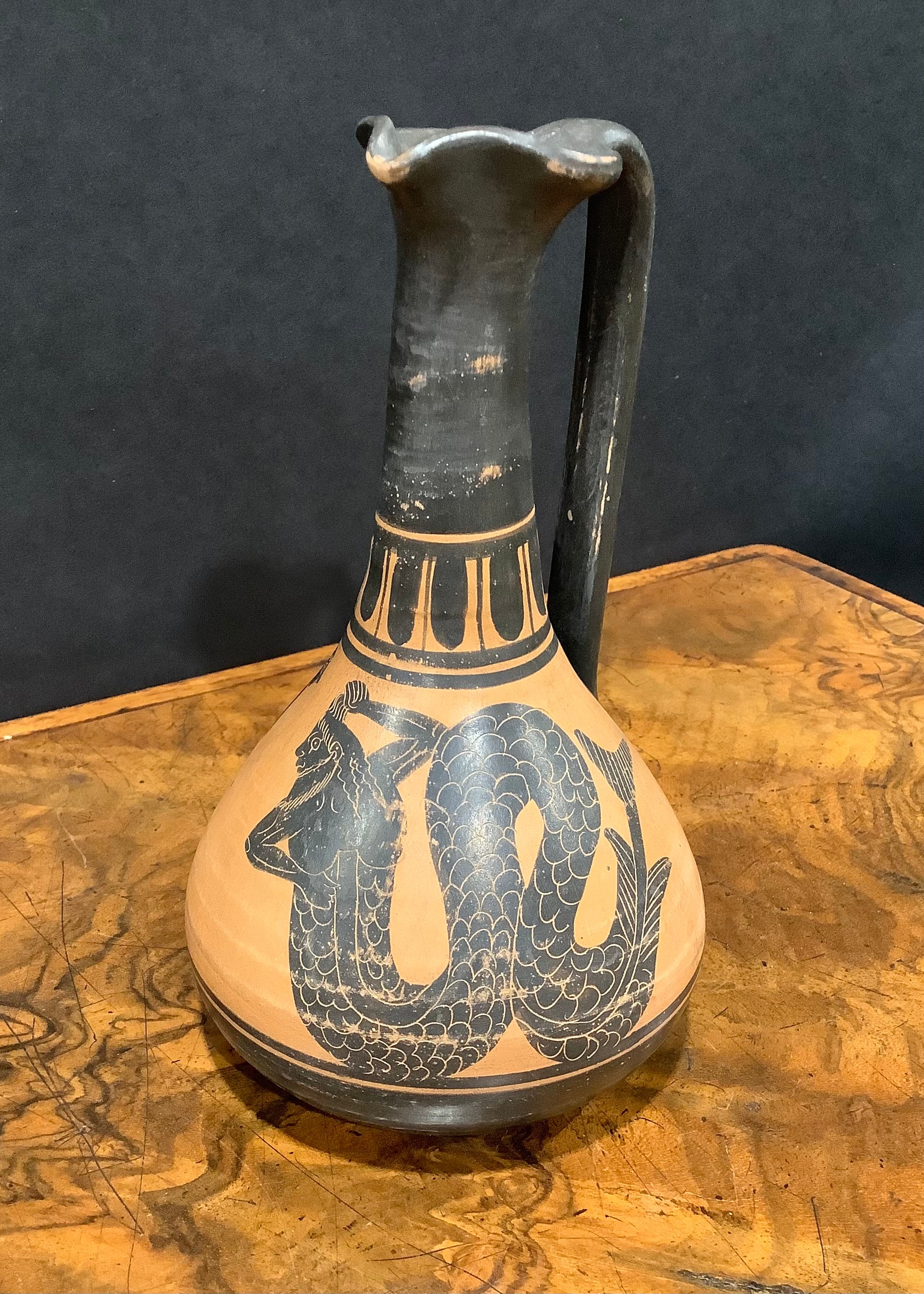 A museum type facsimile, after an Ancient Greek ewer, 15.5cm high