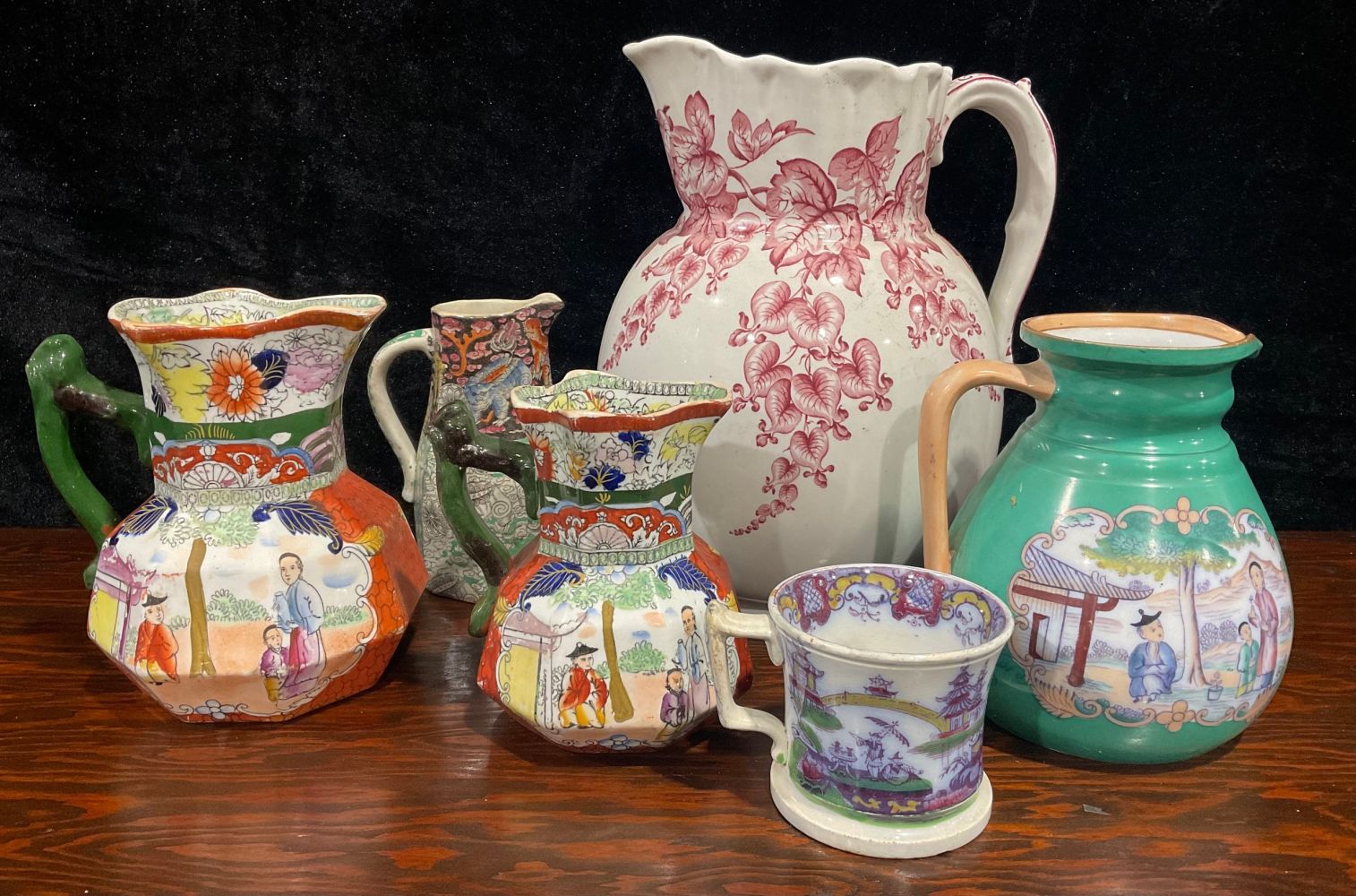 A large Victorian jug; two Masons Ironstone jugs; a Chinese panel jug ...