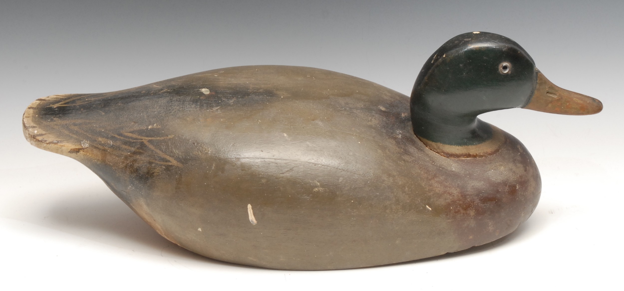 A painted oversized softwood decoy duck, impressed mark to base ...