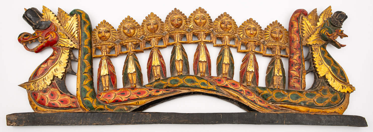 An Indian carved and painted wood transom in the form of eight figures ...
