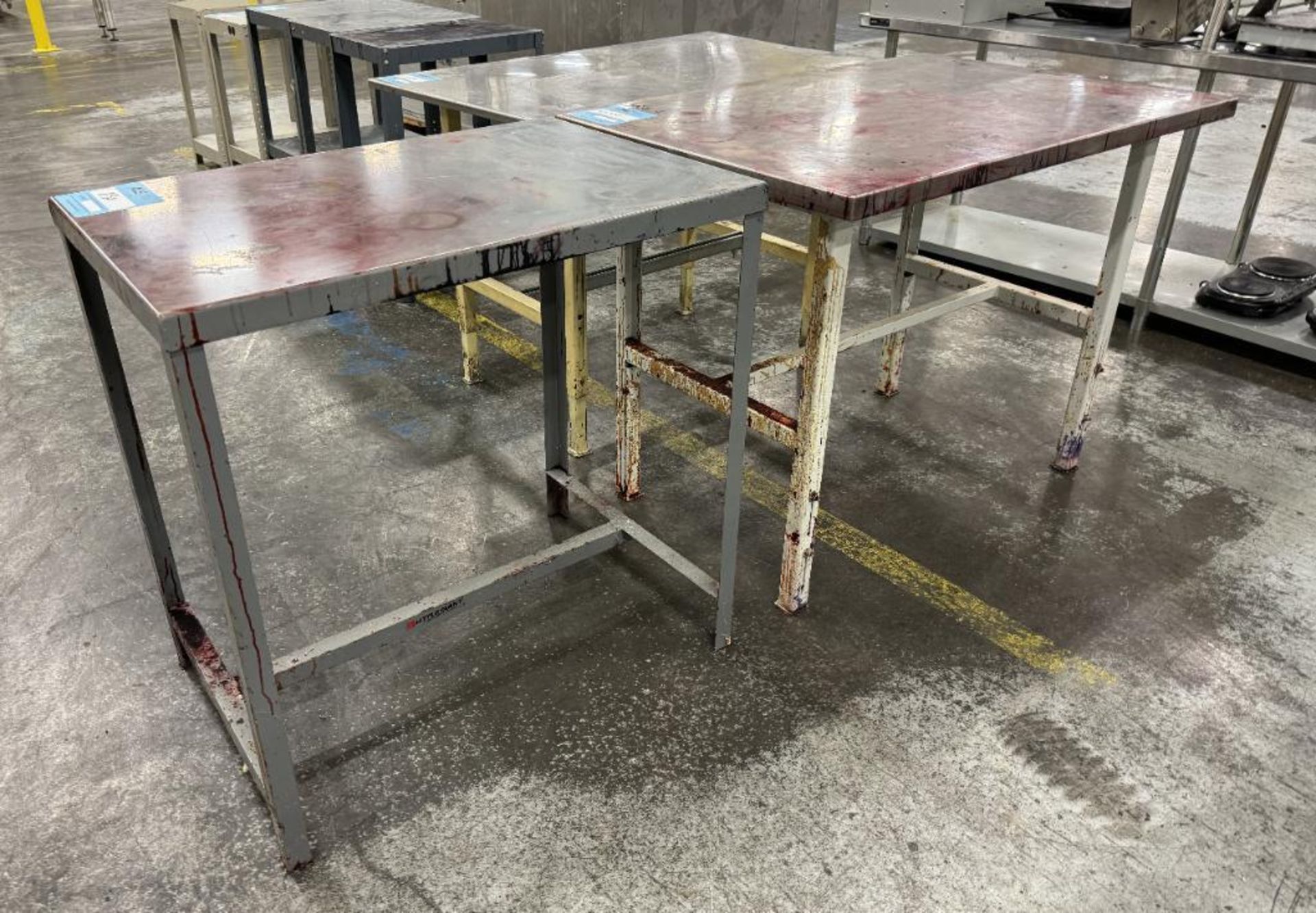 Lot Of (3) Tables. (2) With stainless steel tops, (1) steel.