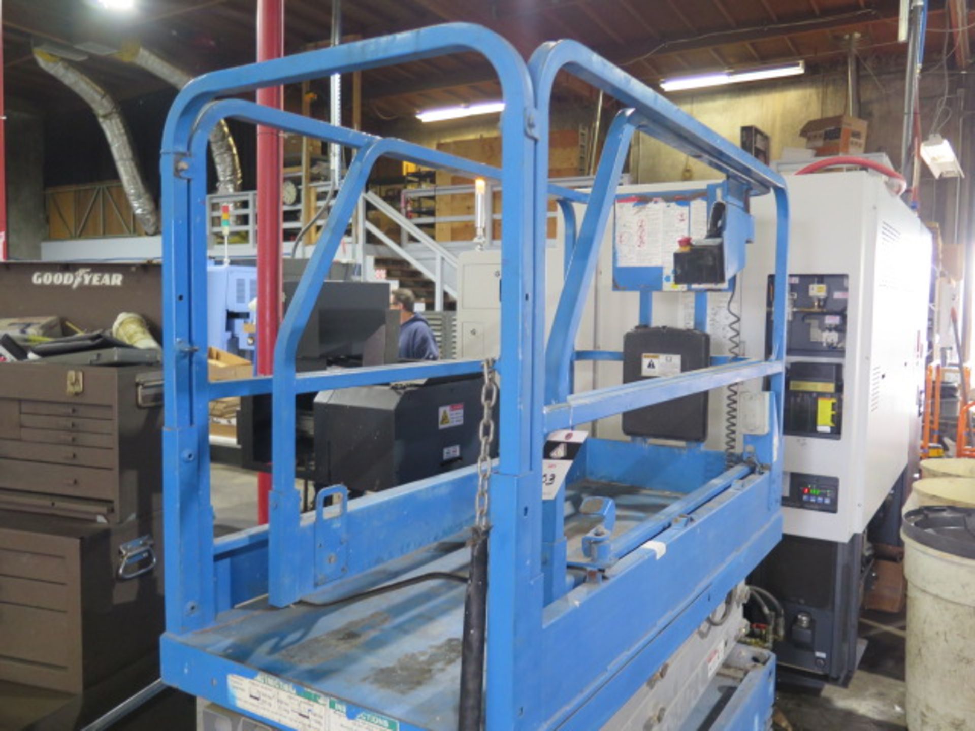 Genie 19’ Electric Scissor Platform Lift (SOLD AS-IS - NO WARRANTY)