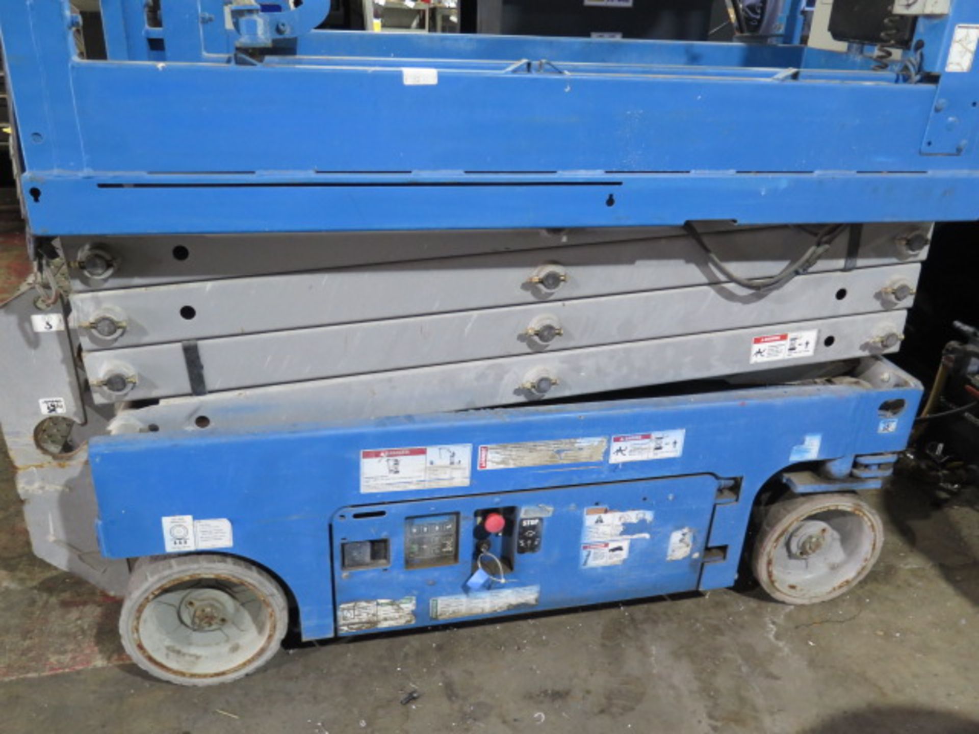 Genie 19’ Electric Scissor Platform Lift (SOLD AS-IS - NO WARRANTY)
