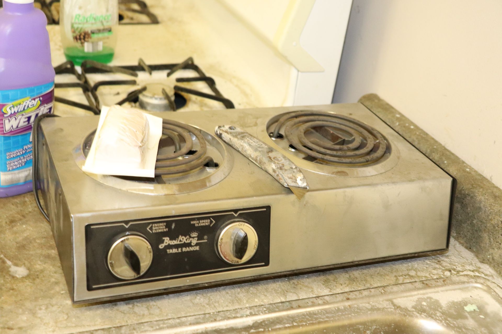 Haier mini fridge, Sharp Carousel microwave, and Royal King electric range