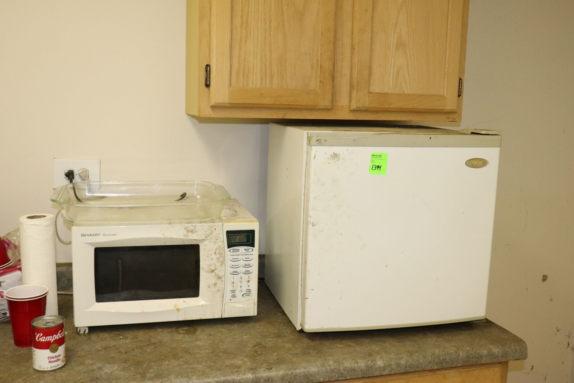 Haier mini fridge, Sharp Carousel microwave, and Royal King electric range