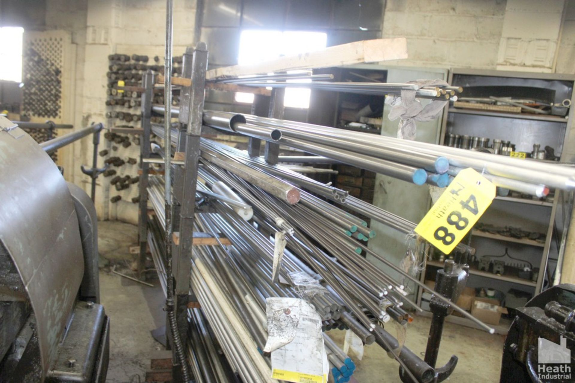 LARGE QTY OF STEEL BAR STOCK ON RACK (JARKE STANDS NOT INCLUDED)