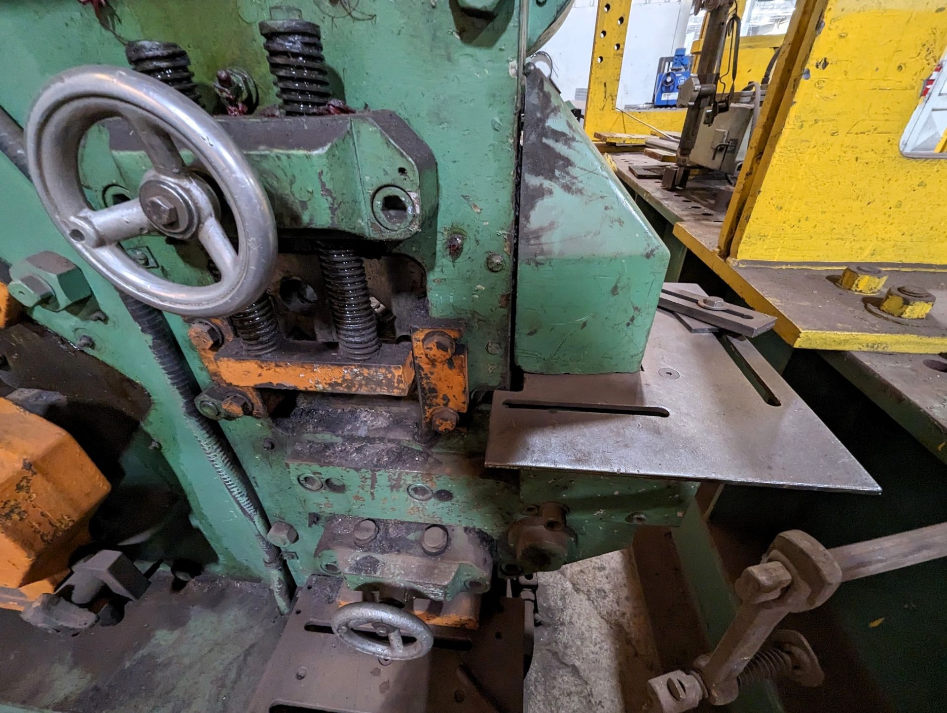 PEDDINGHAUS 210 SUPER 20 HYDRAULIC IRONWORKER, 120-TON PUNCH CAP., 6” X ...