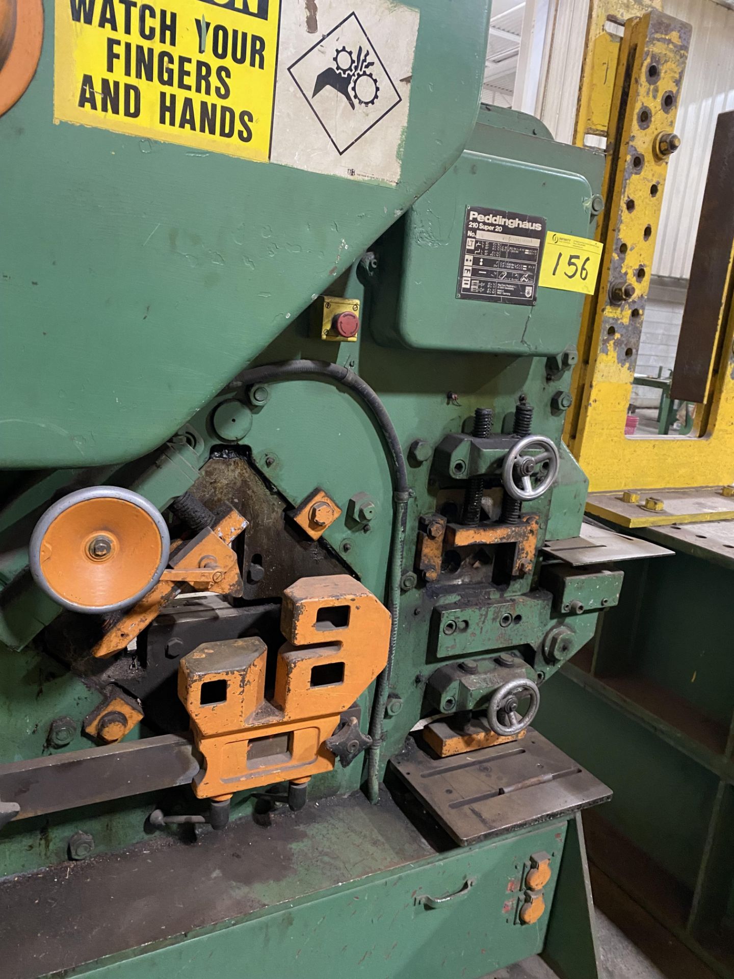 PEDDINGHAUS 210 SUPER 20 HYDRAULIC IRONWORKER, 120-TON PUNCH CAP., 6” X ...